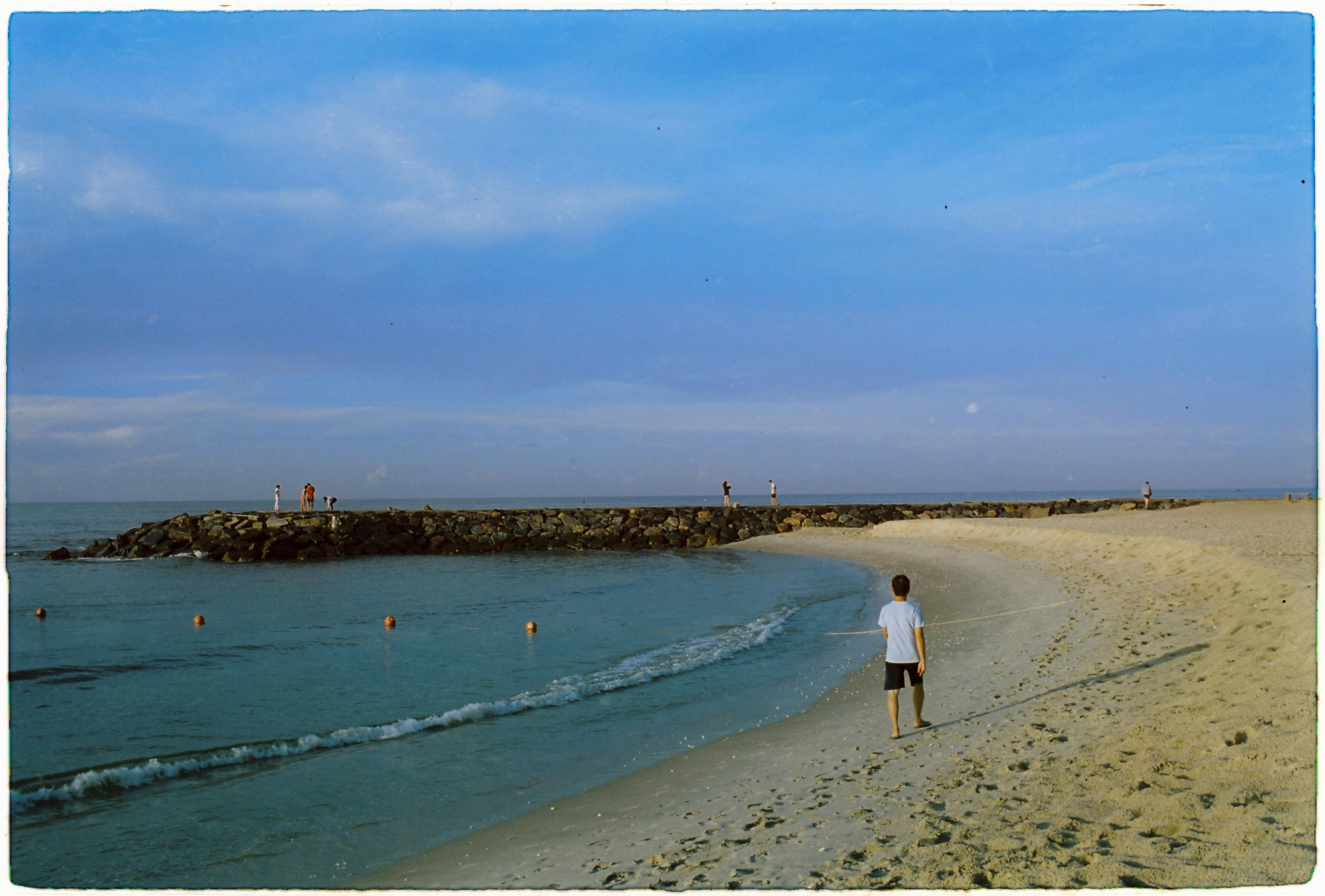 People on an Island Among Sea · Free Stock Photo
