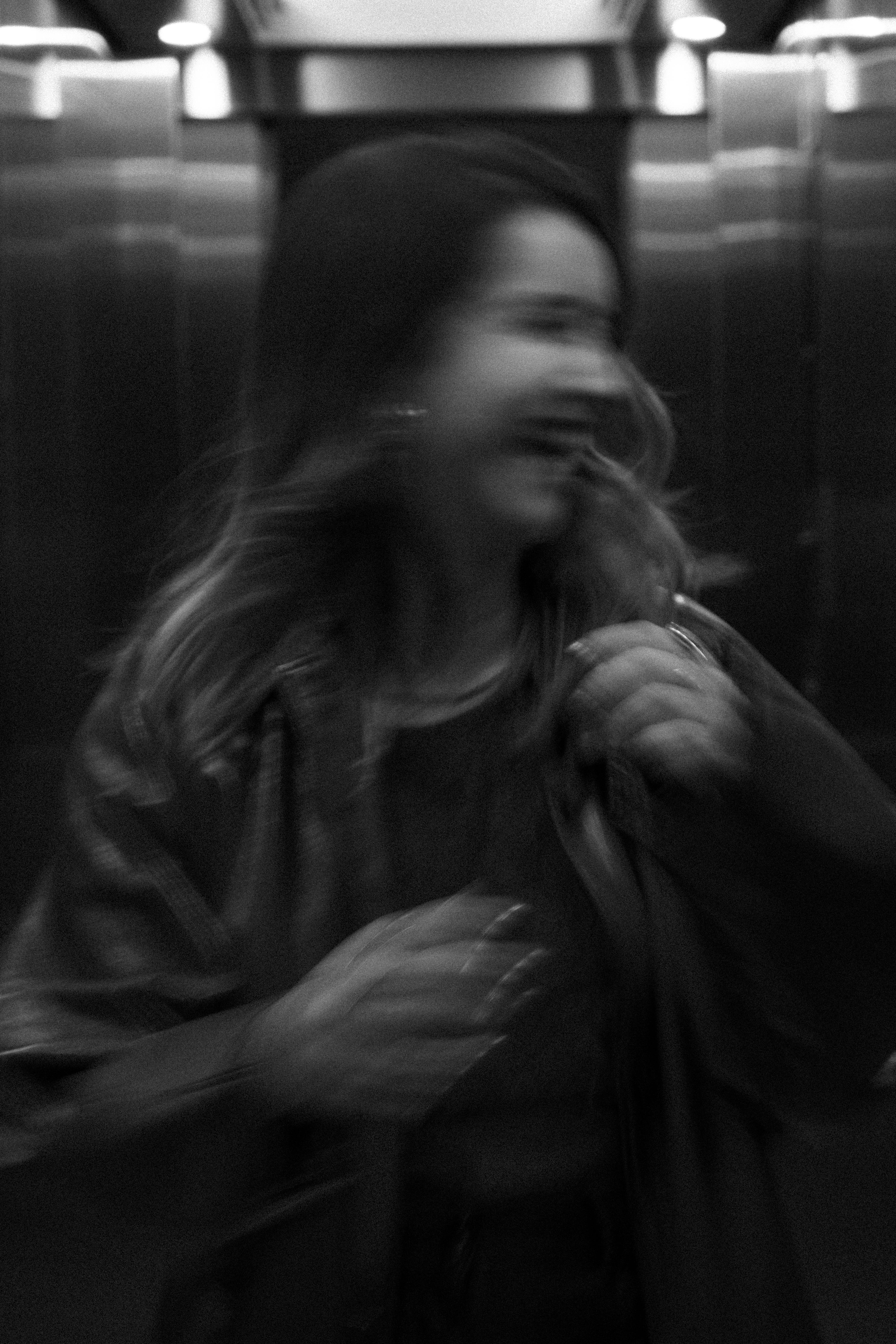 Woman Laughing in Elevator · Free Stock Photo