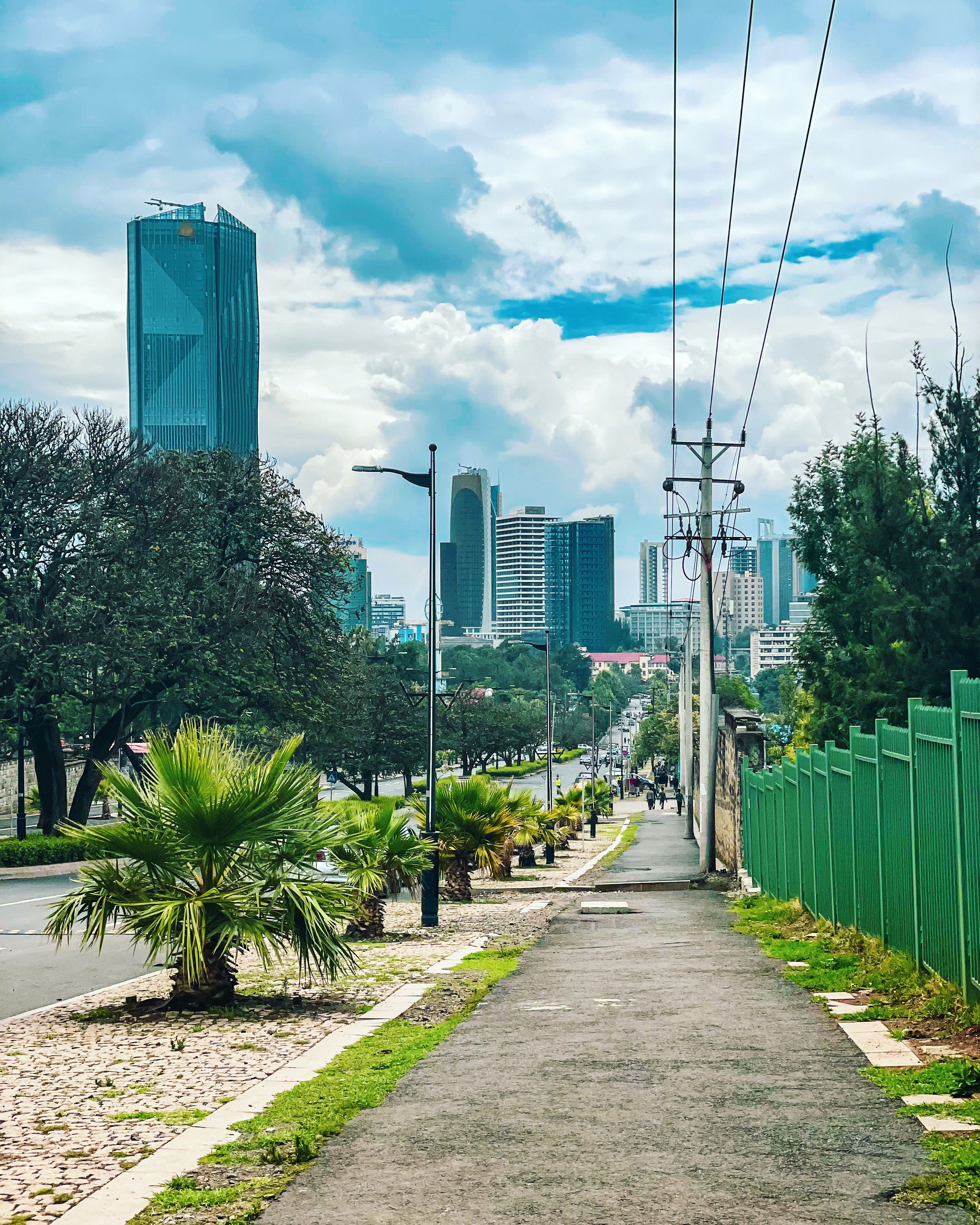 Sidewalk under Power Lines in City · Free Stock Photo