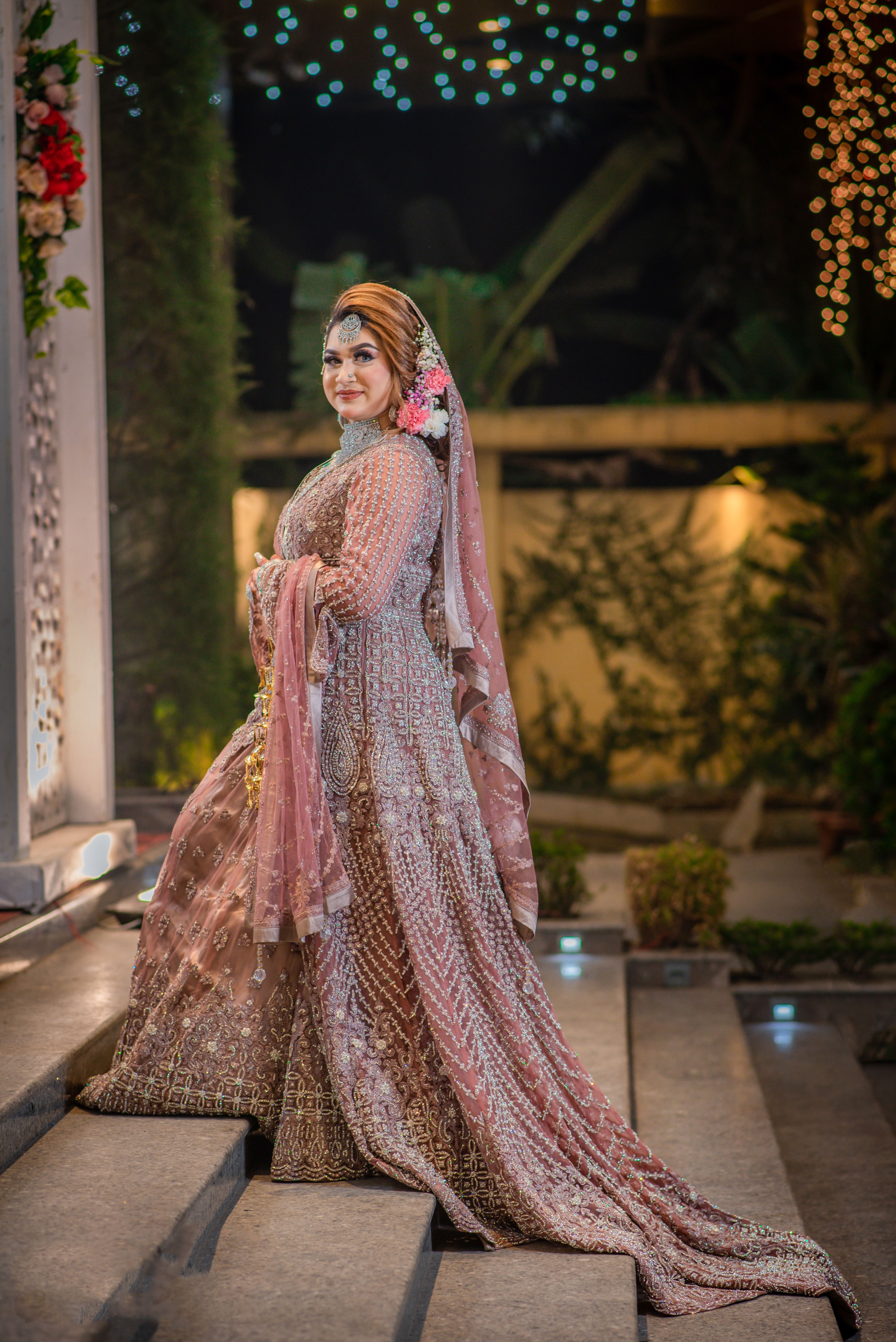 Photo of a Smiling Woman in a Traditional Indian Wedding Dress Standing ...