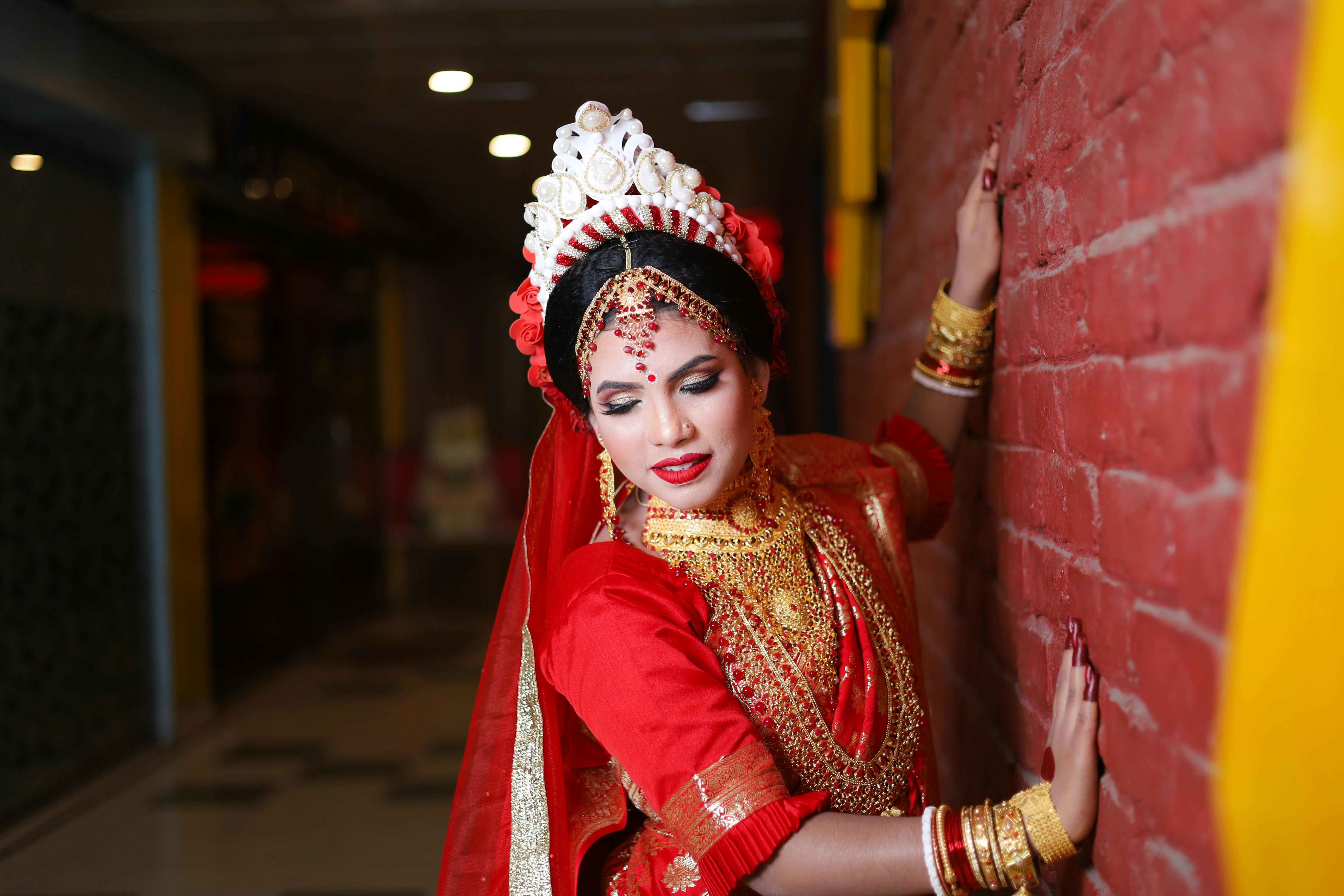 Woman in Traditional Clothing and Jewellery · Free Stock Photo