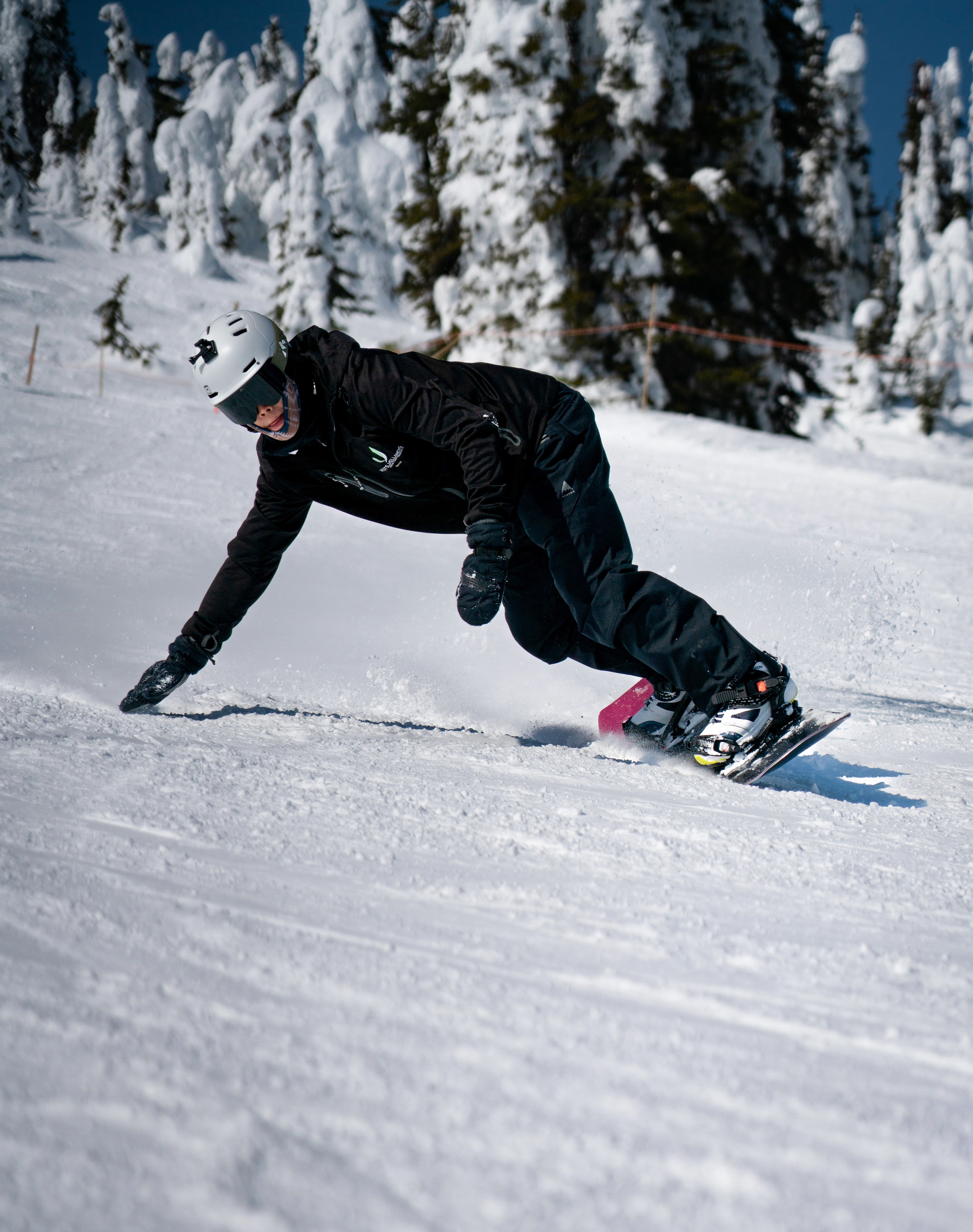 Two Women Standing with the Snowboards in the Mountains · Free Stock Photo