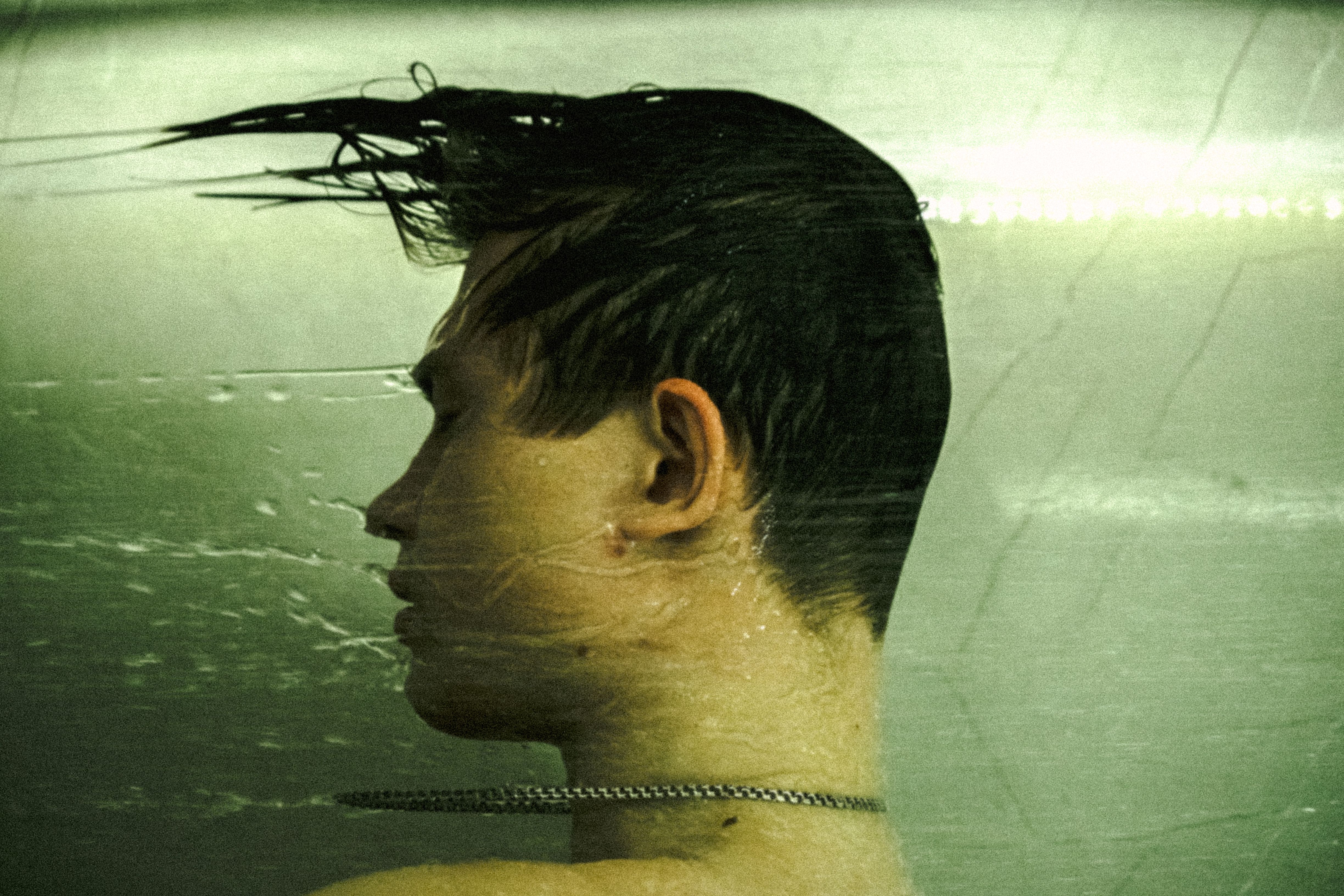 A Portrait of a Young Man in the Darkness in Motion · Free Stock Photo