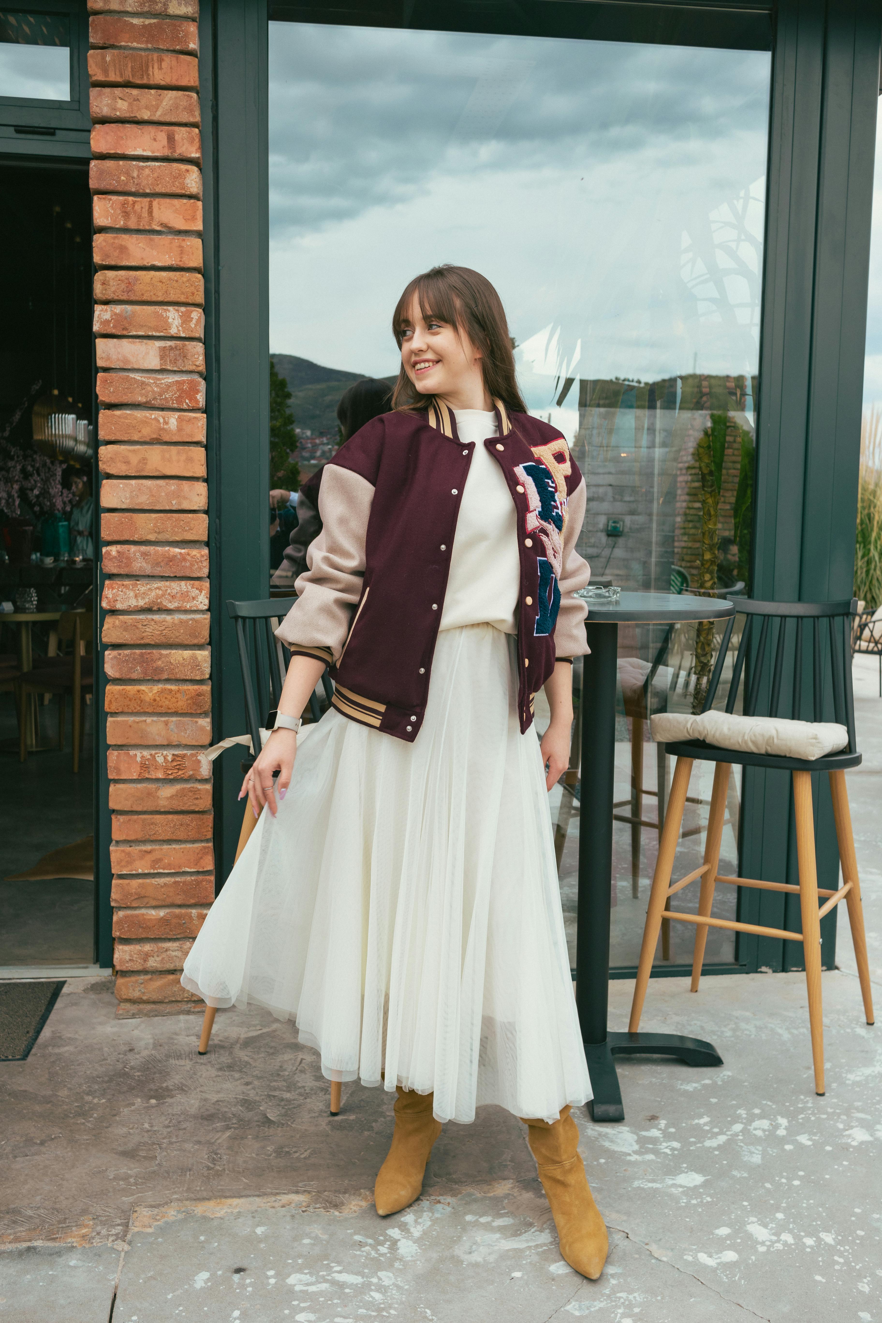 Smiling Model in Dress and Jacket · Free Stock Photo
