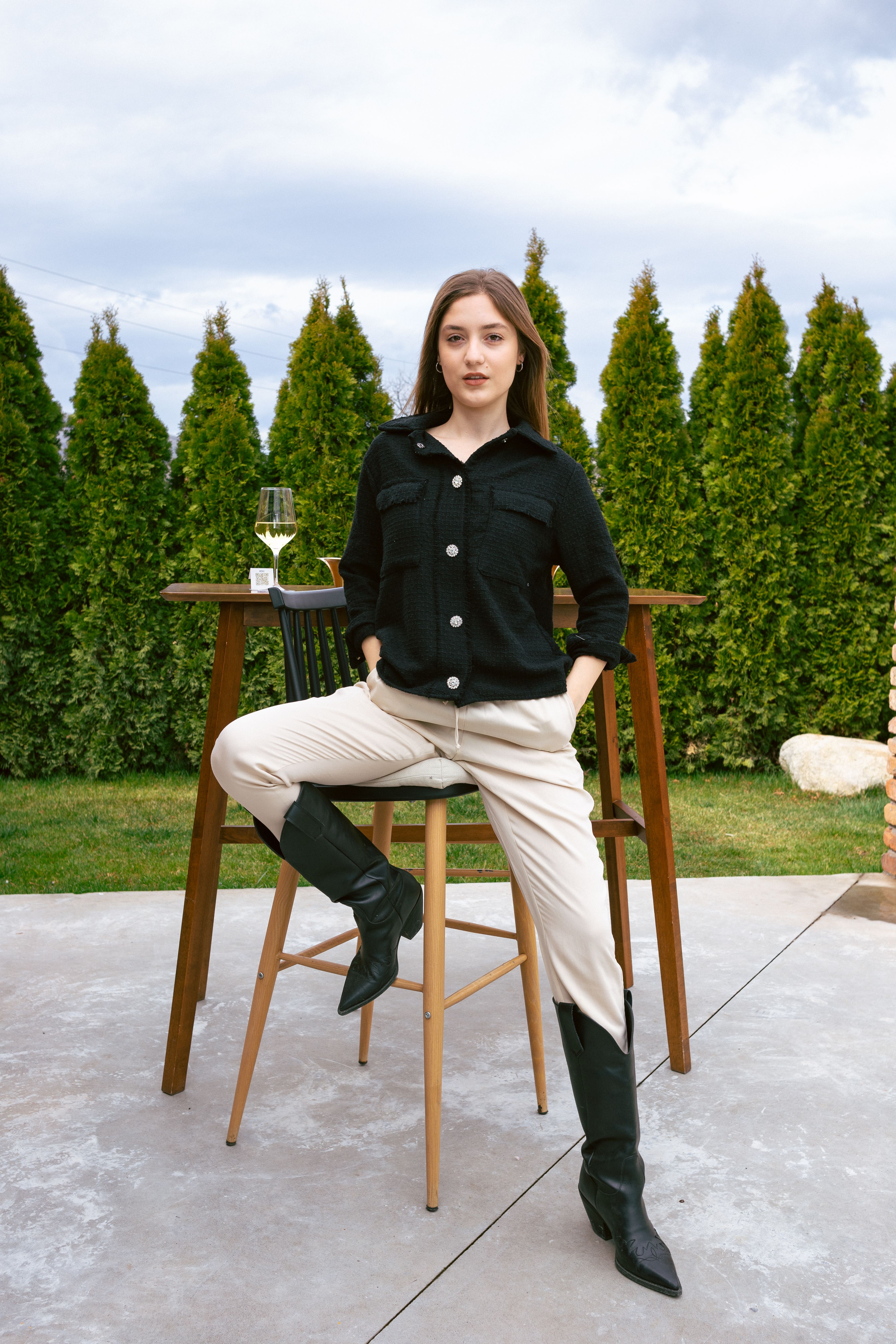 Model in Black Blouse and Boots · Free Stock Photo
