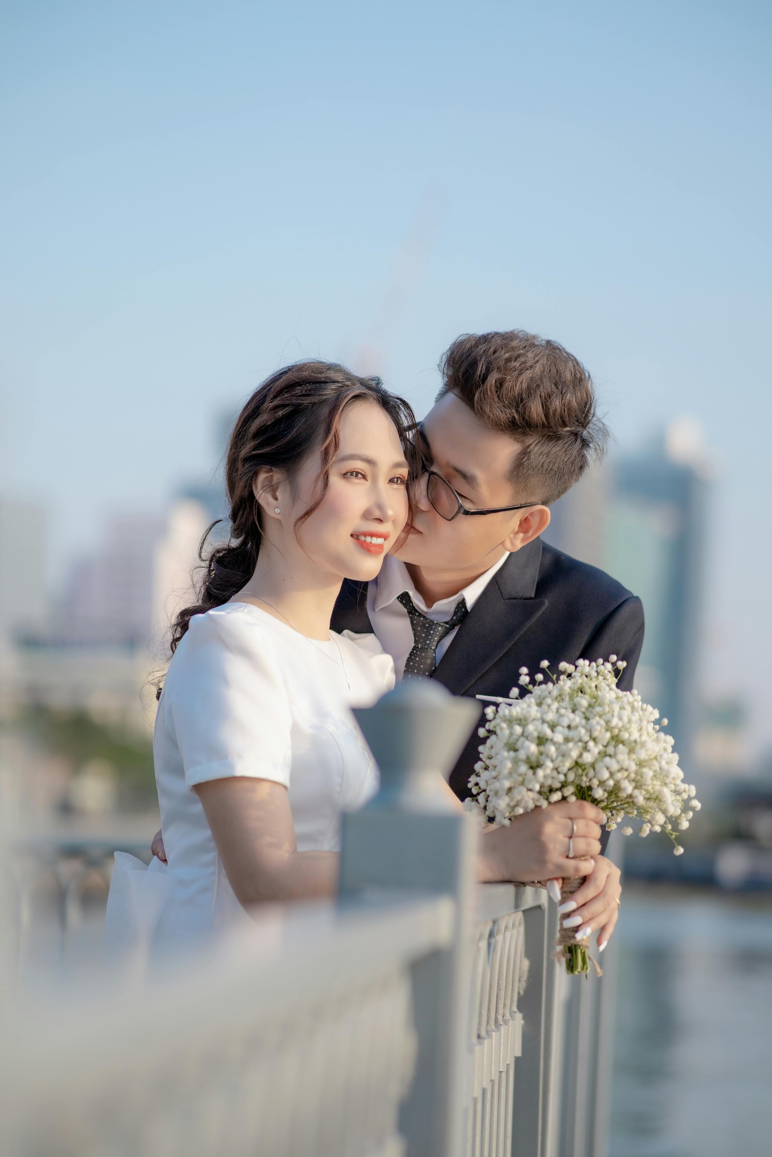 Couple Kissing at Wedding Ceremony · Free Stock Photo