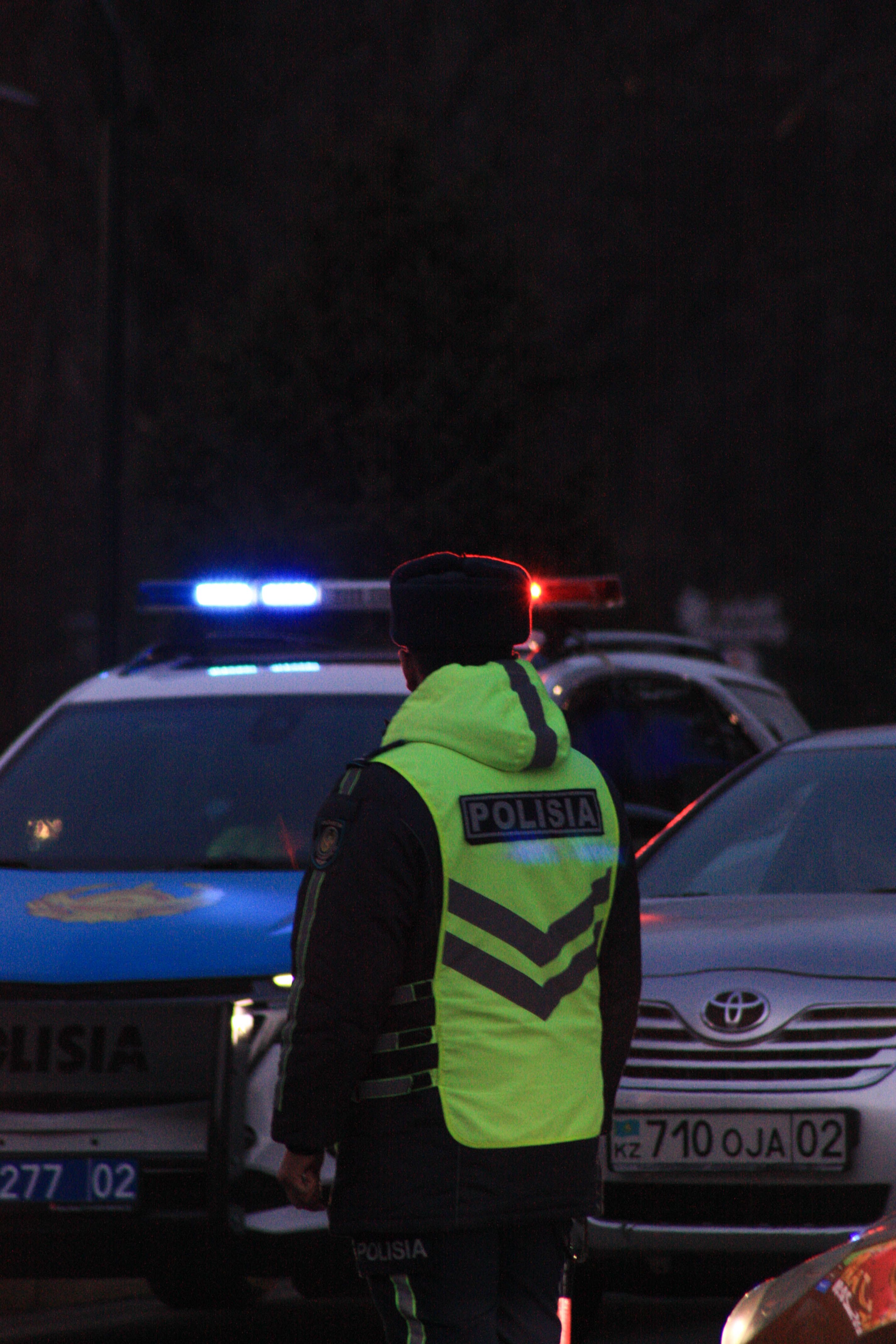 Policeman and Cars on City Street · Free Stock Photo