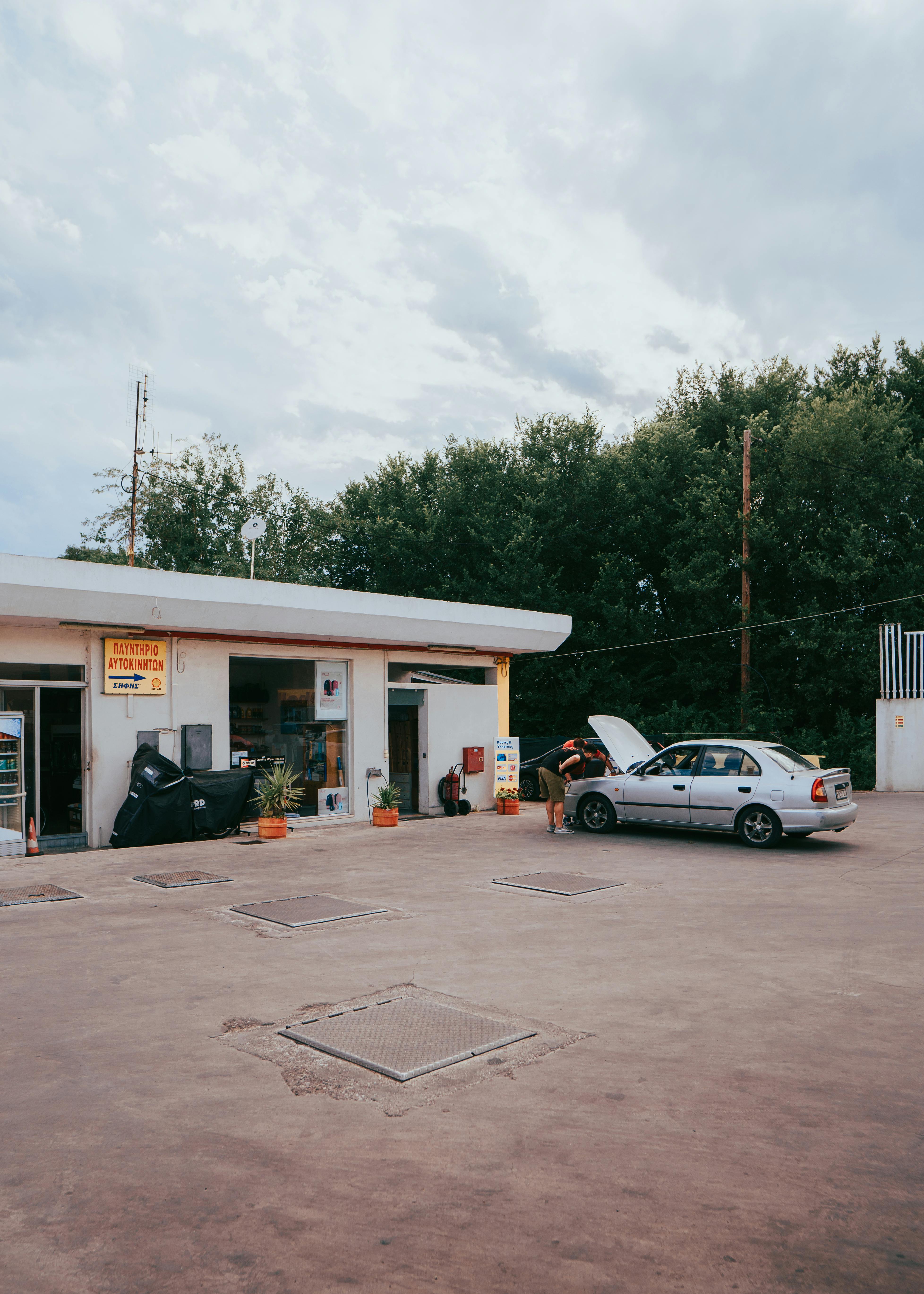 Black Convertible Car on a Parking Lot · Free Stock Photo