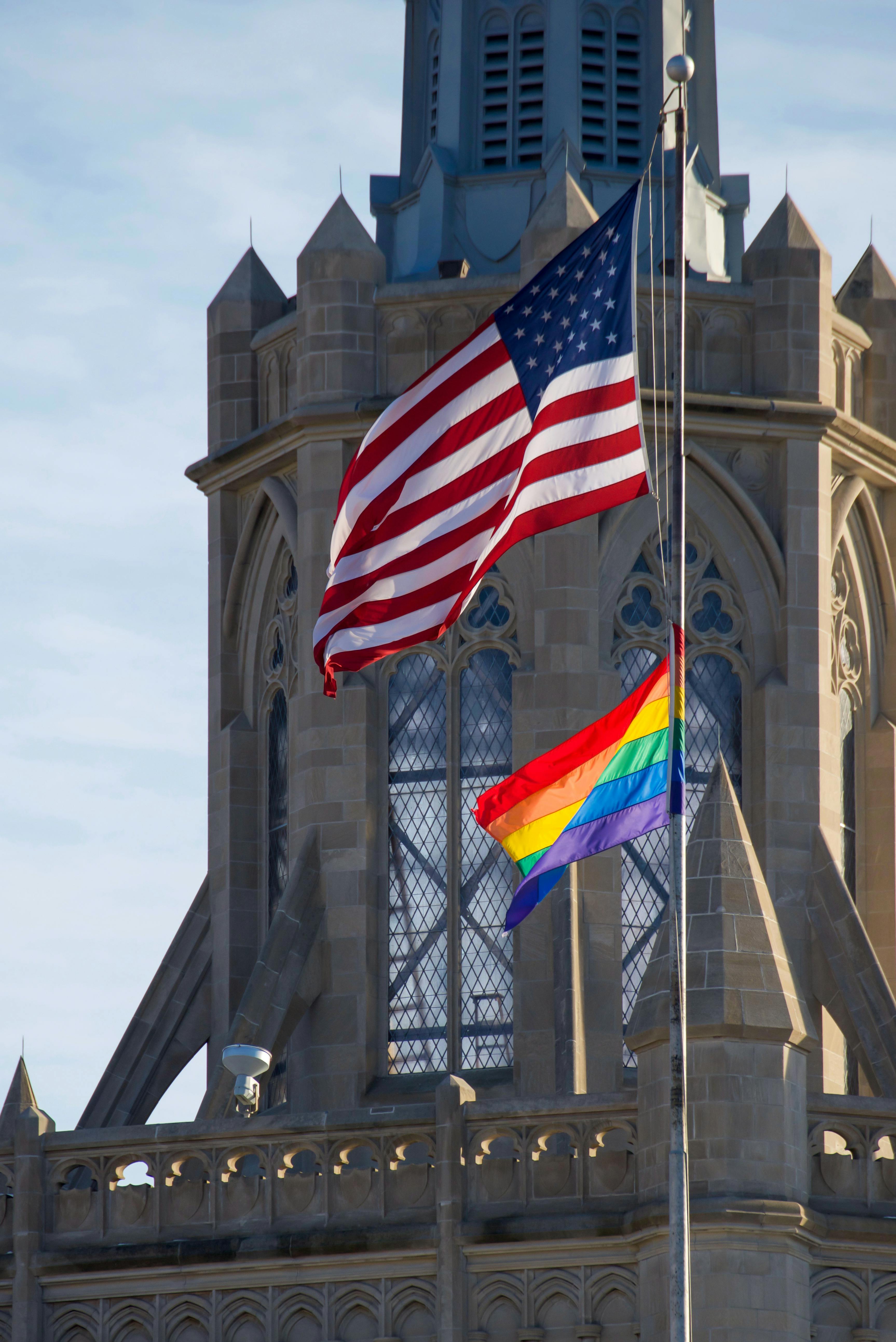 Rainbow Flag Next Flag of USA · Free Stock Photo