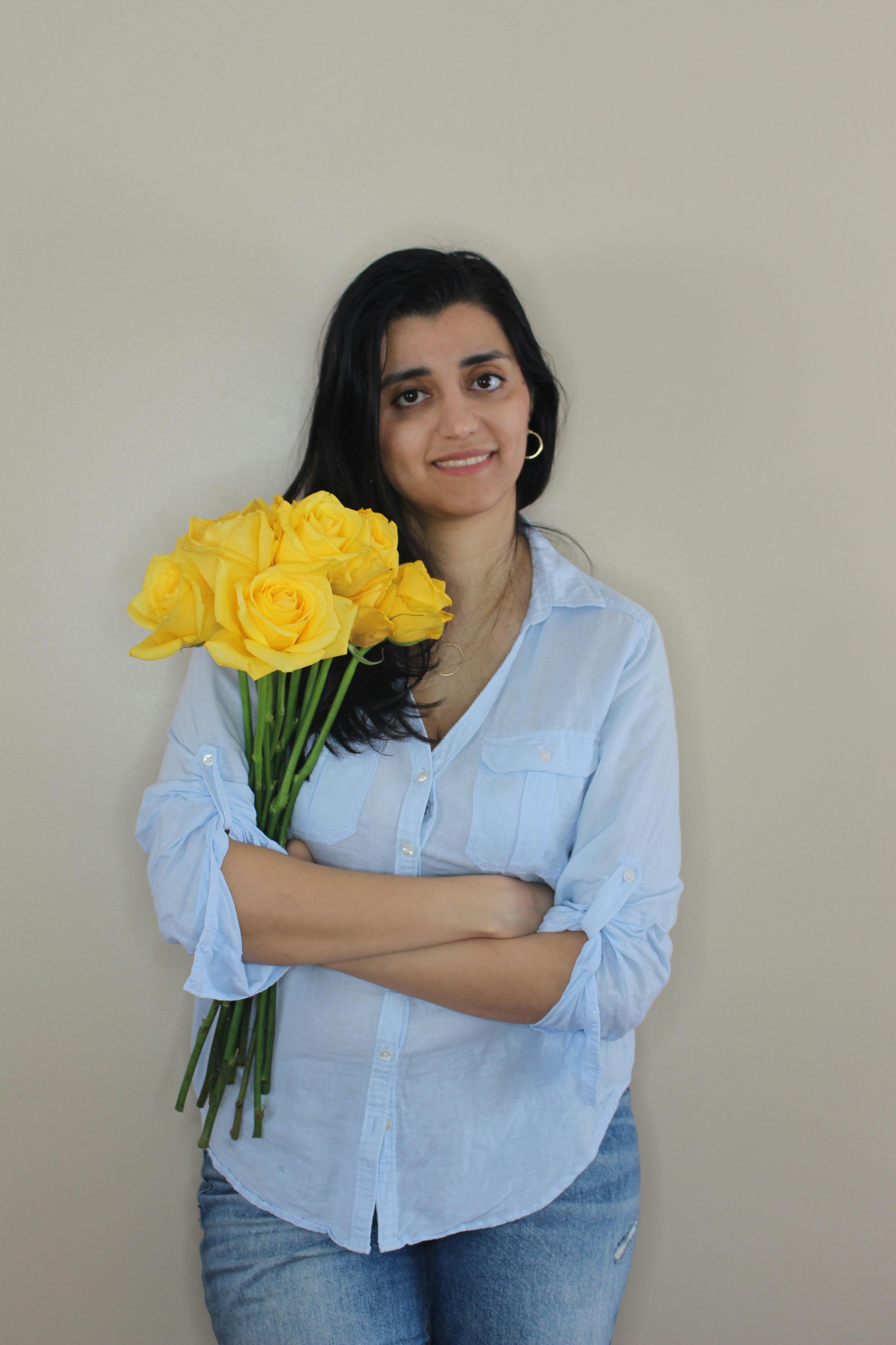 Woman with Yellow Roses · Free Stock Photo