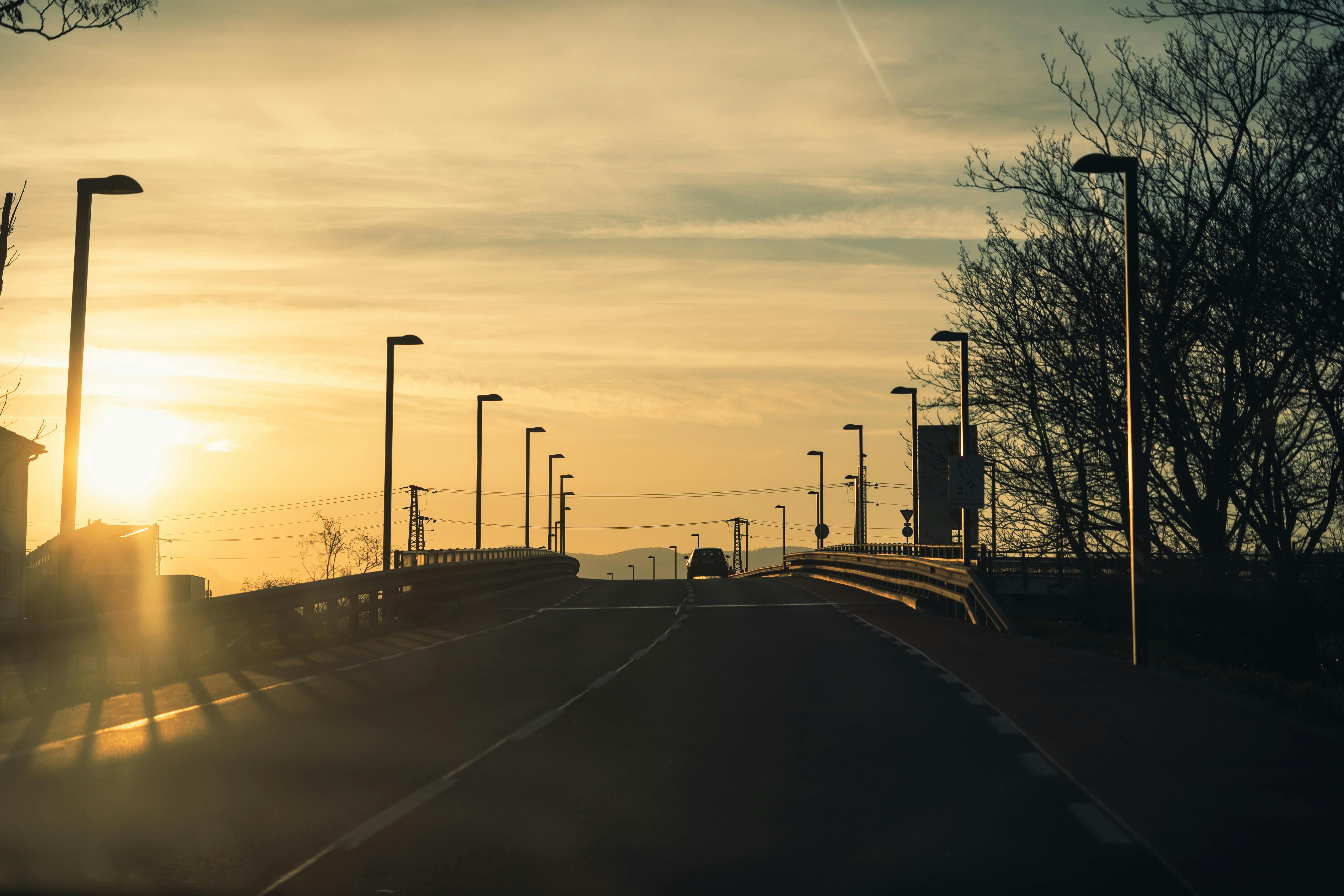 Cars on Road at Sunset · Free Stock Photo