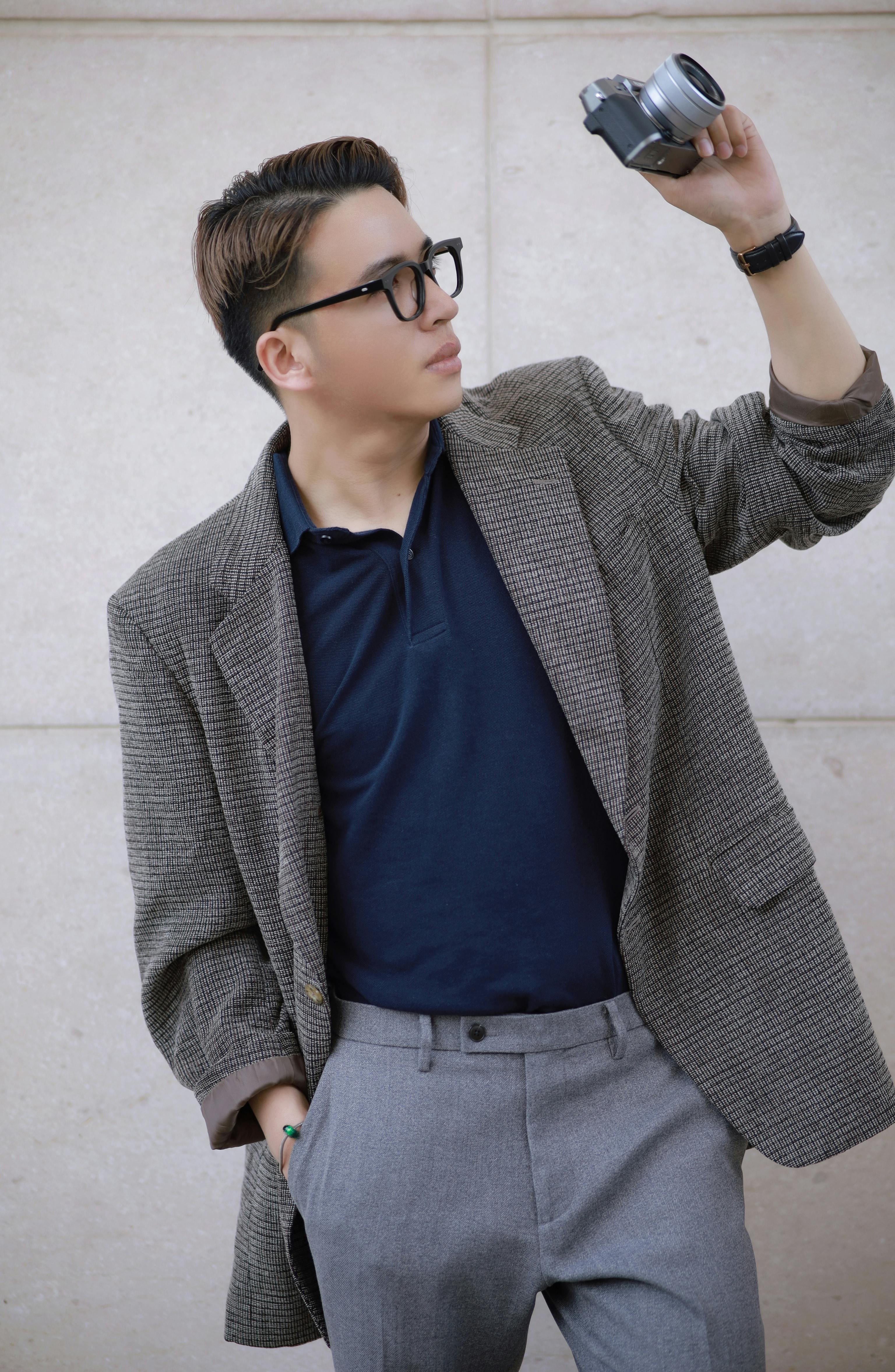 Man Using Camera on City Street · Free Stock Photo