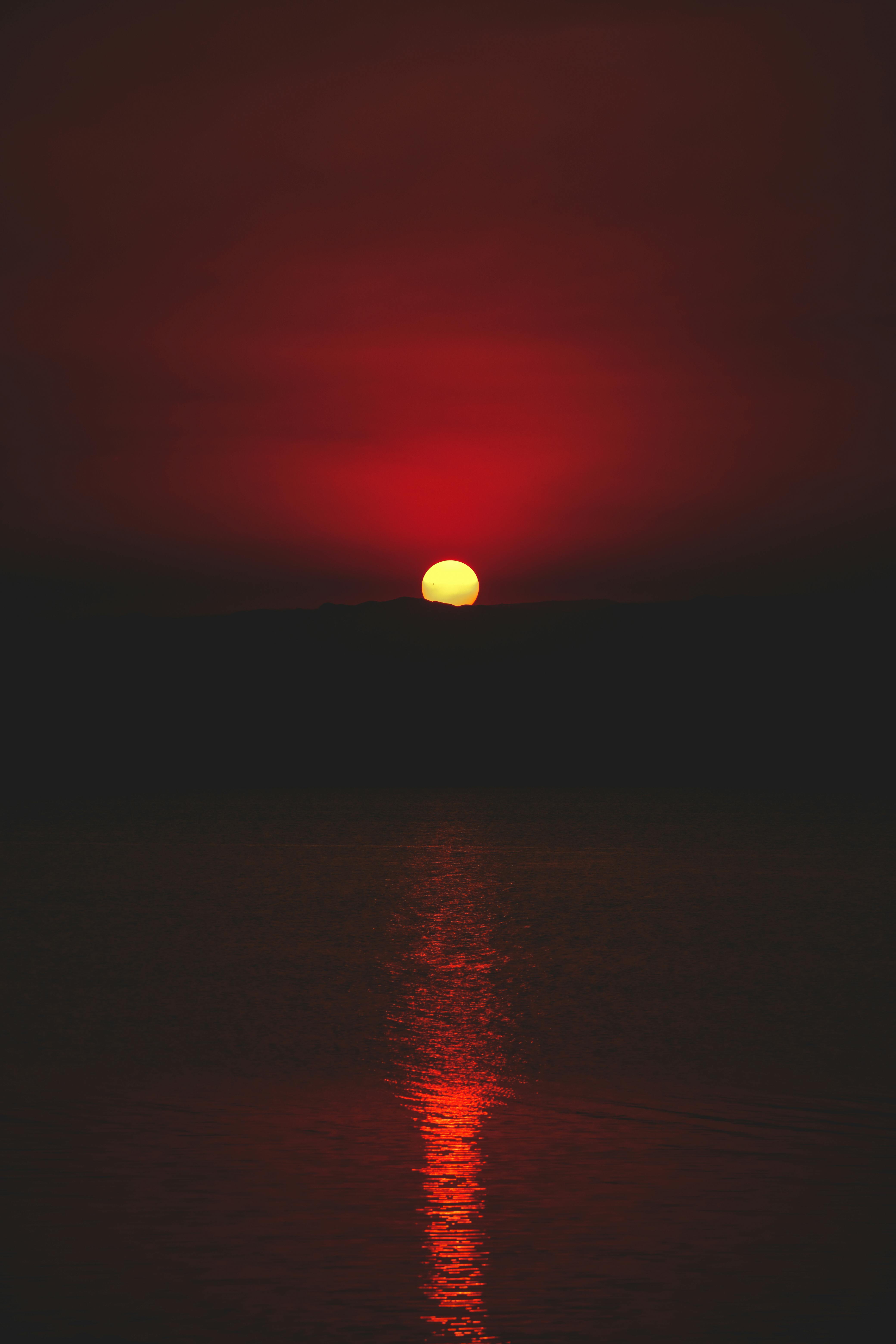 Moon on Red Sky at Sunset · Free Stock Photo