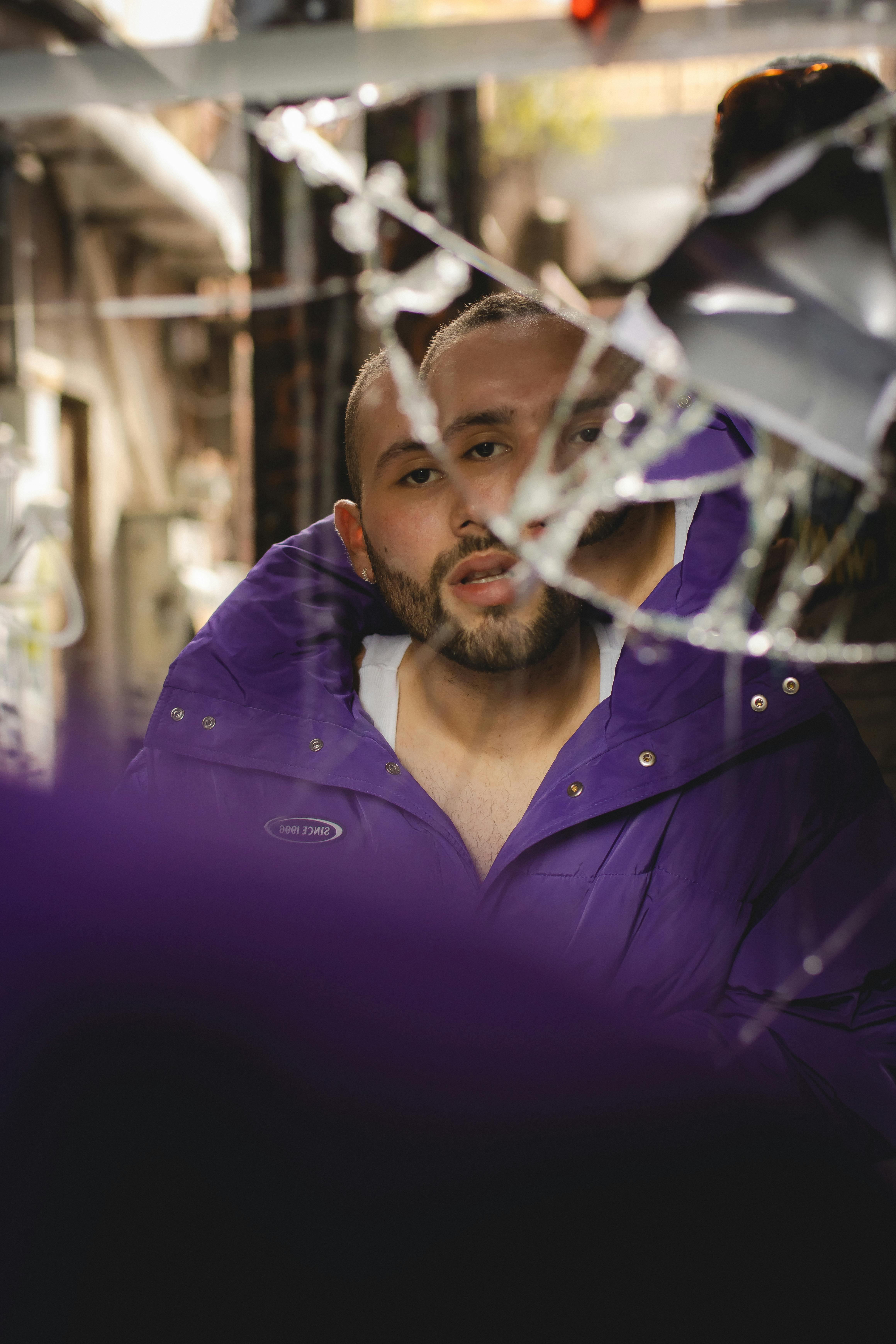 Man in front of a Broken Mirror · Free Stock Photo