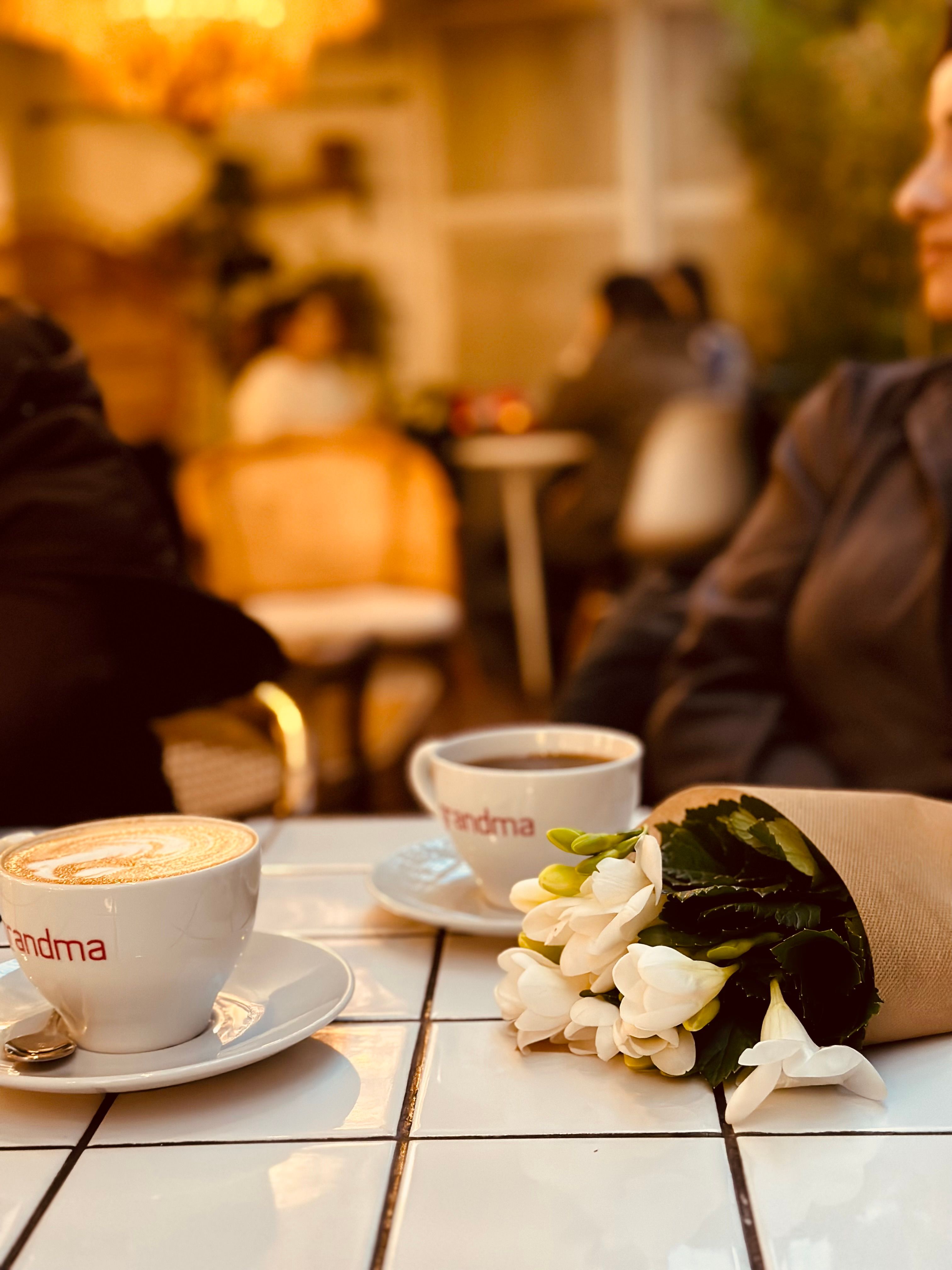 Two Coffees on Cafe Table · Free Stock Photo