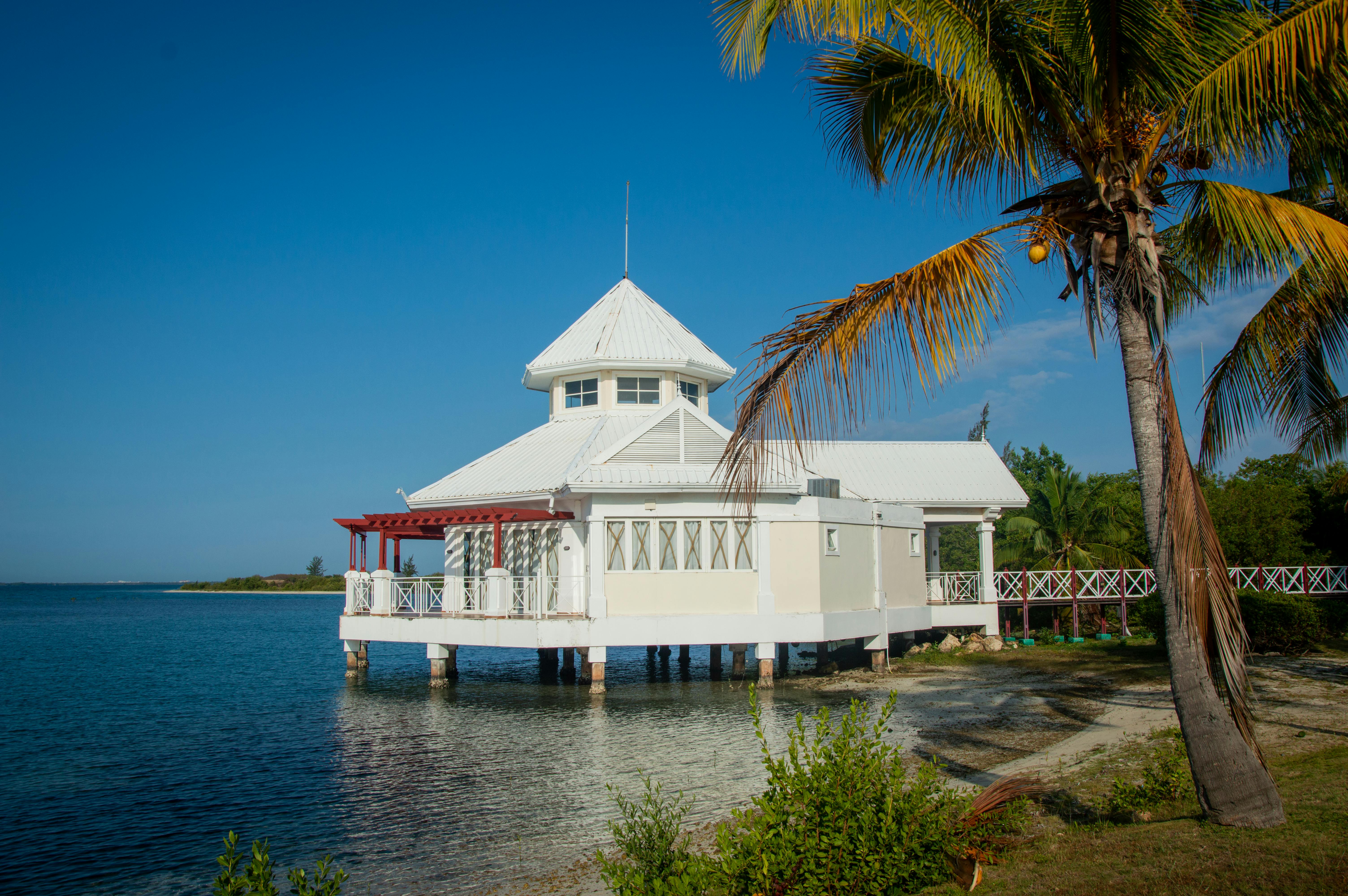 White Building on Sea Shore · Free Stock Photo