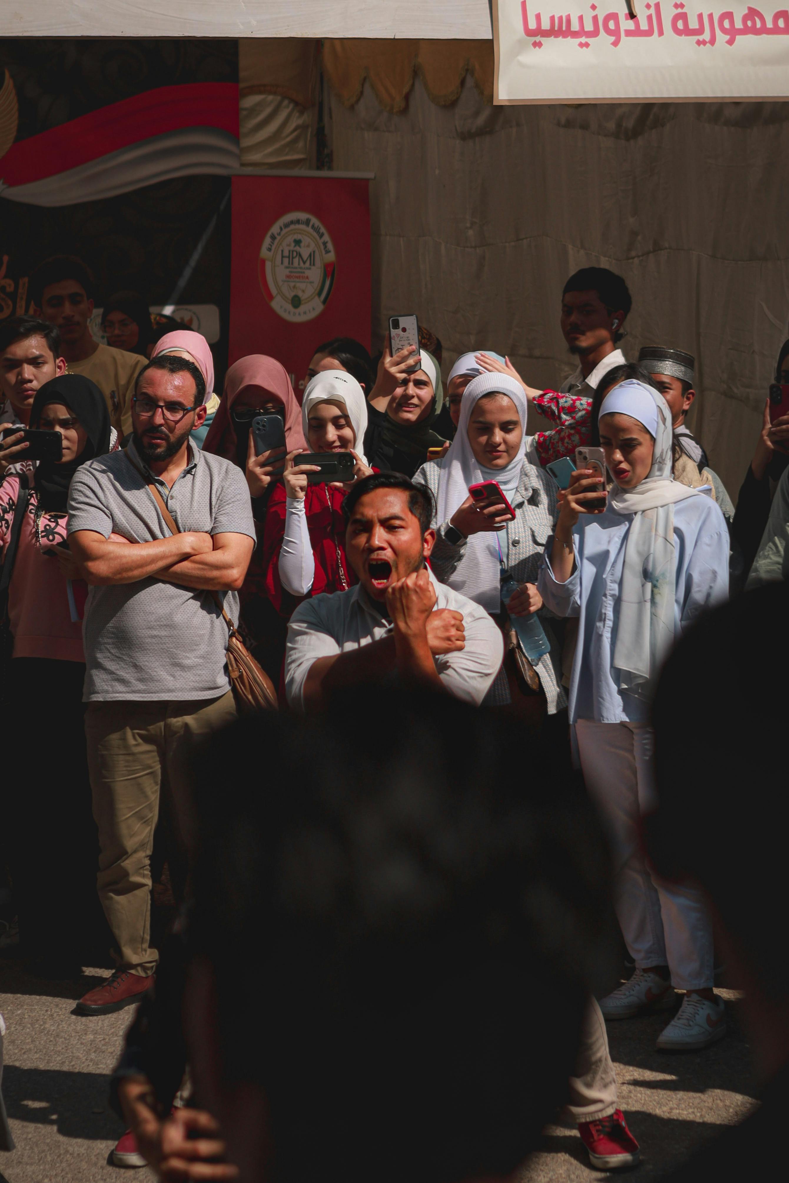 Screaming Crowd on Street · Free Stock Photo