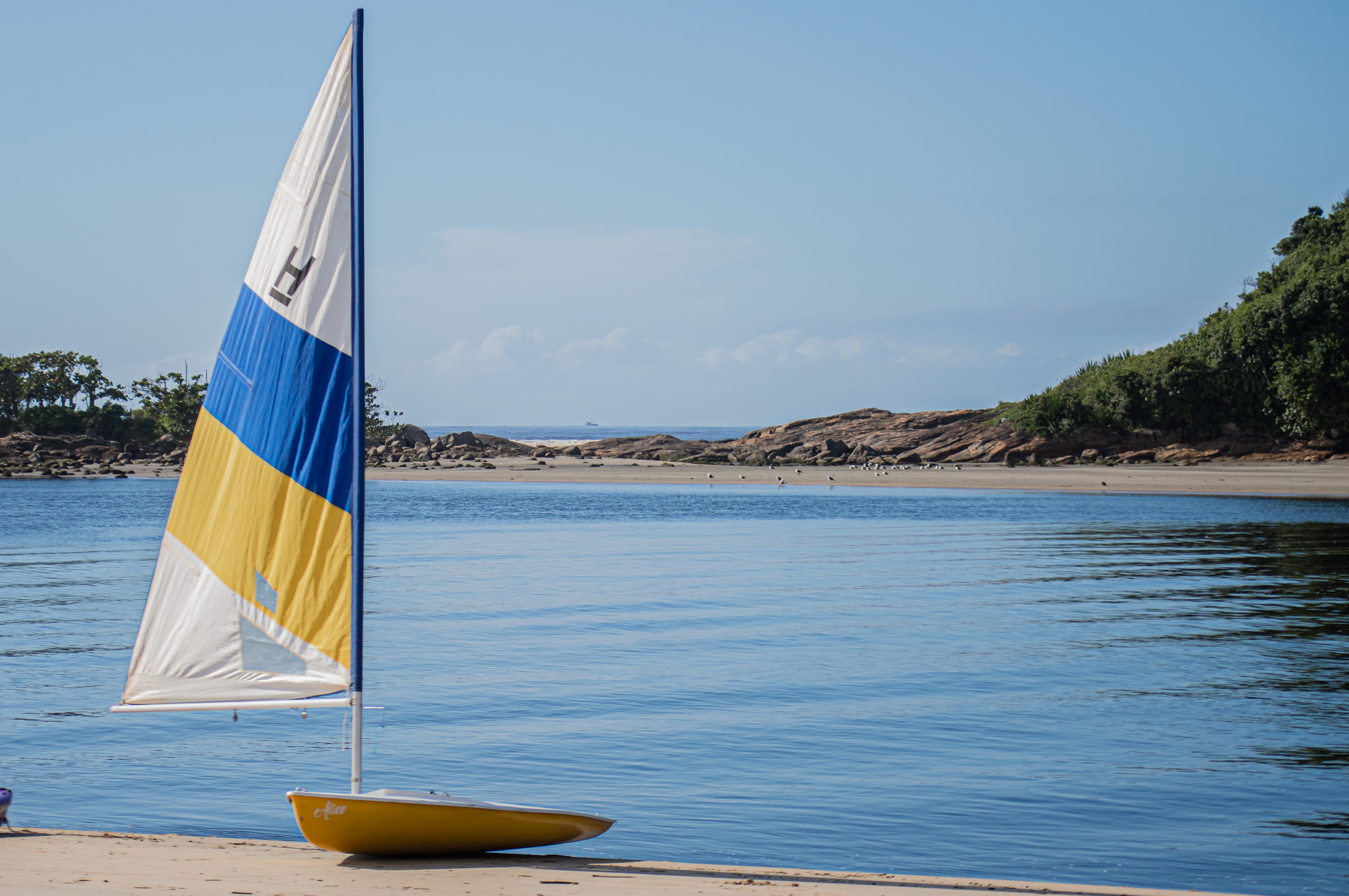 Sailboat on Coast · Free Stock Photo