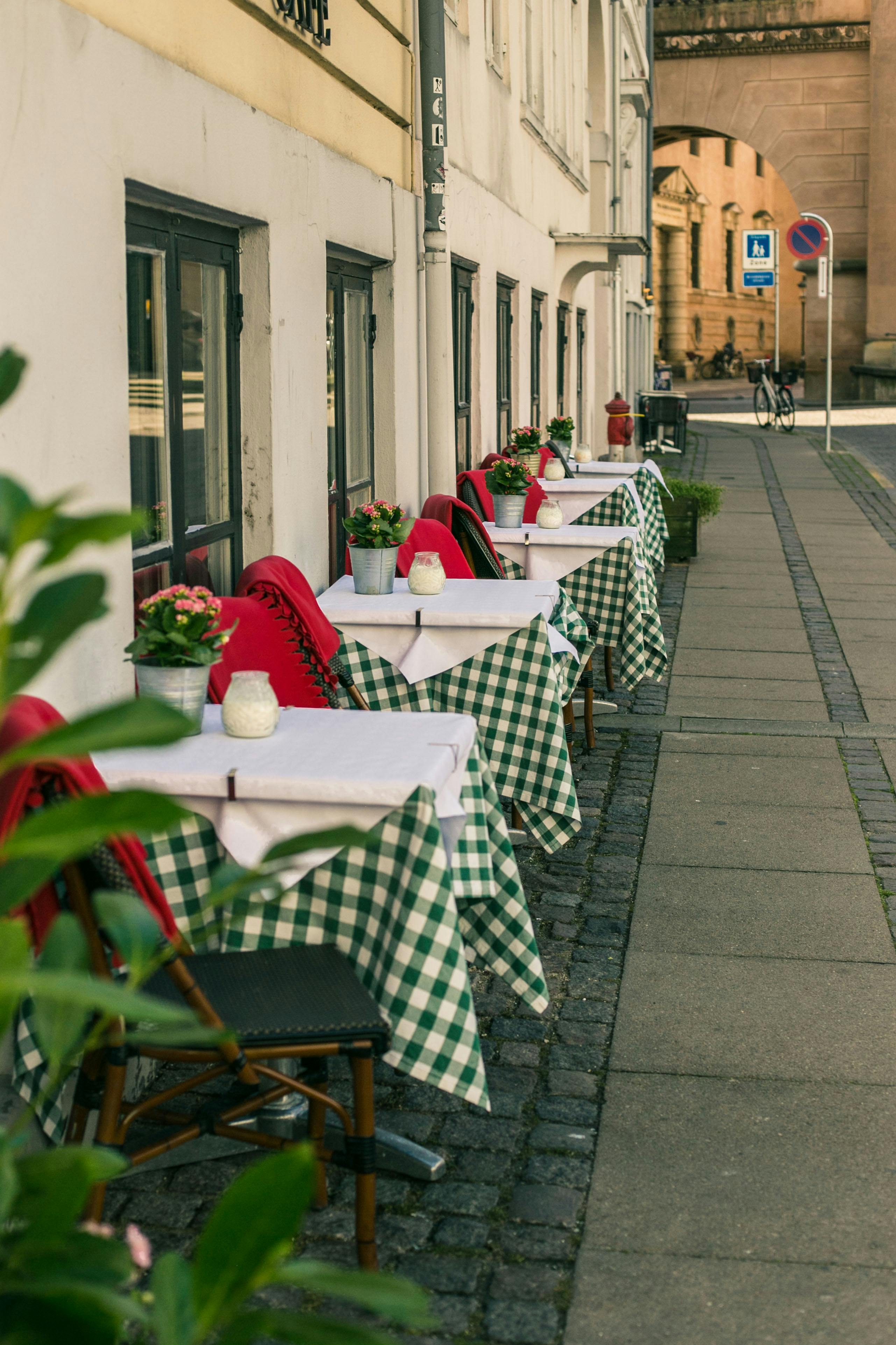 Dining Tables Outside The Restaurant · Free Stock Photo