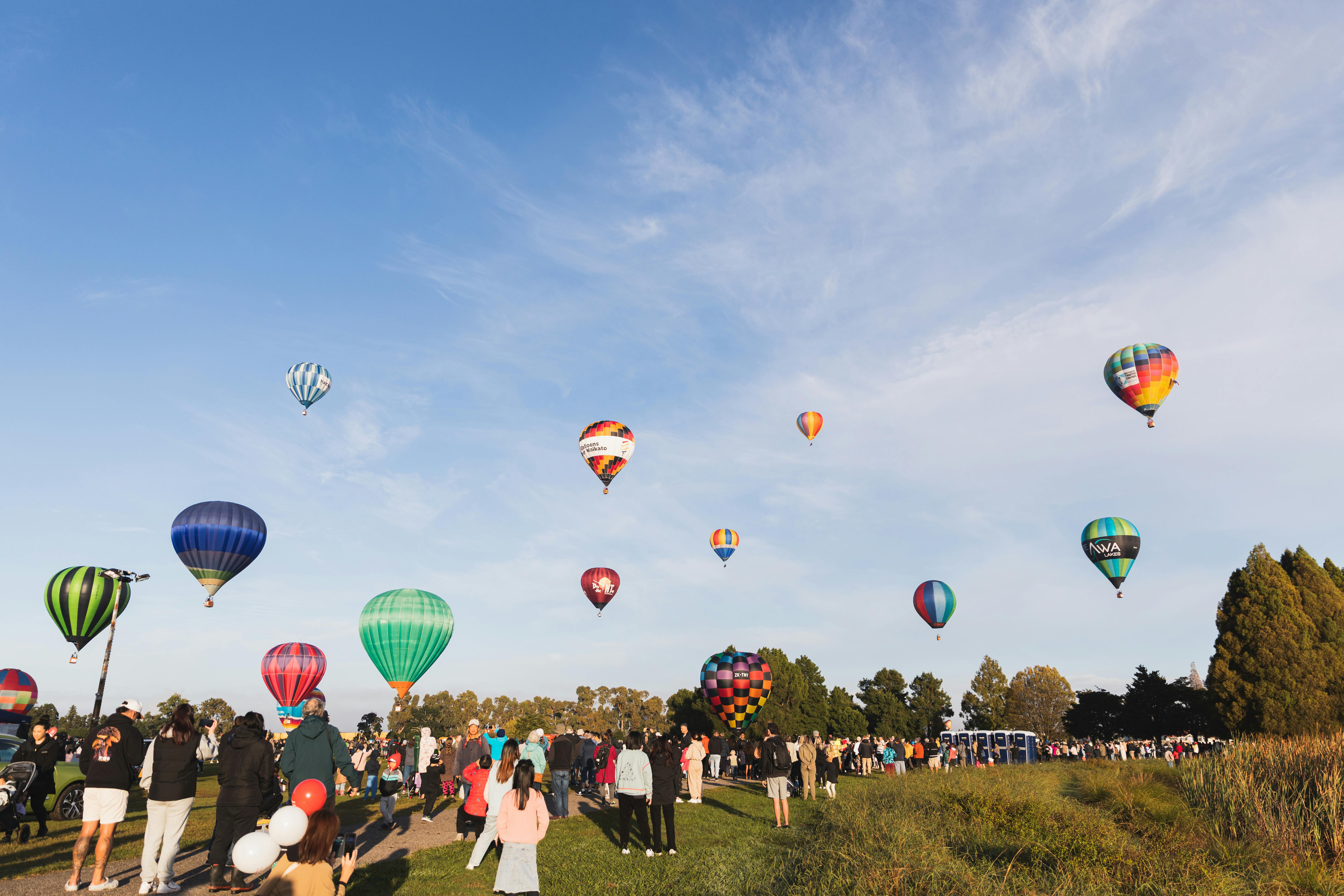 Colorful Hot Air Boons Filling the Sky over Hamilton · Free Stock Photo
