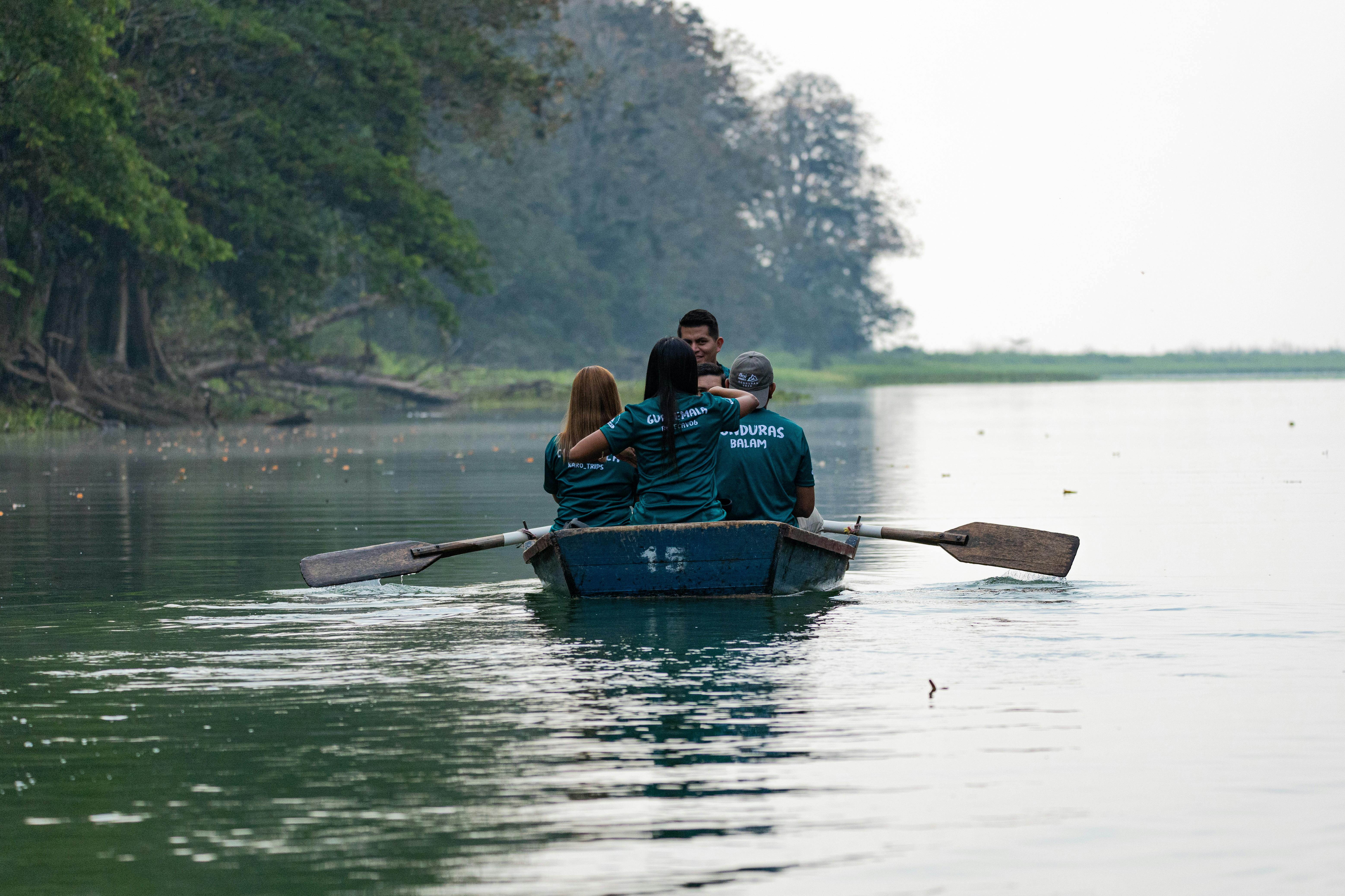 Group in Rowboat · Free Stock Photo