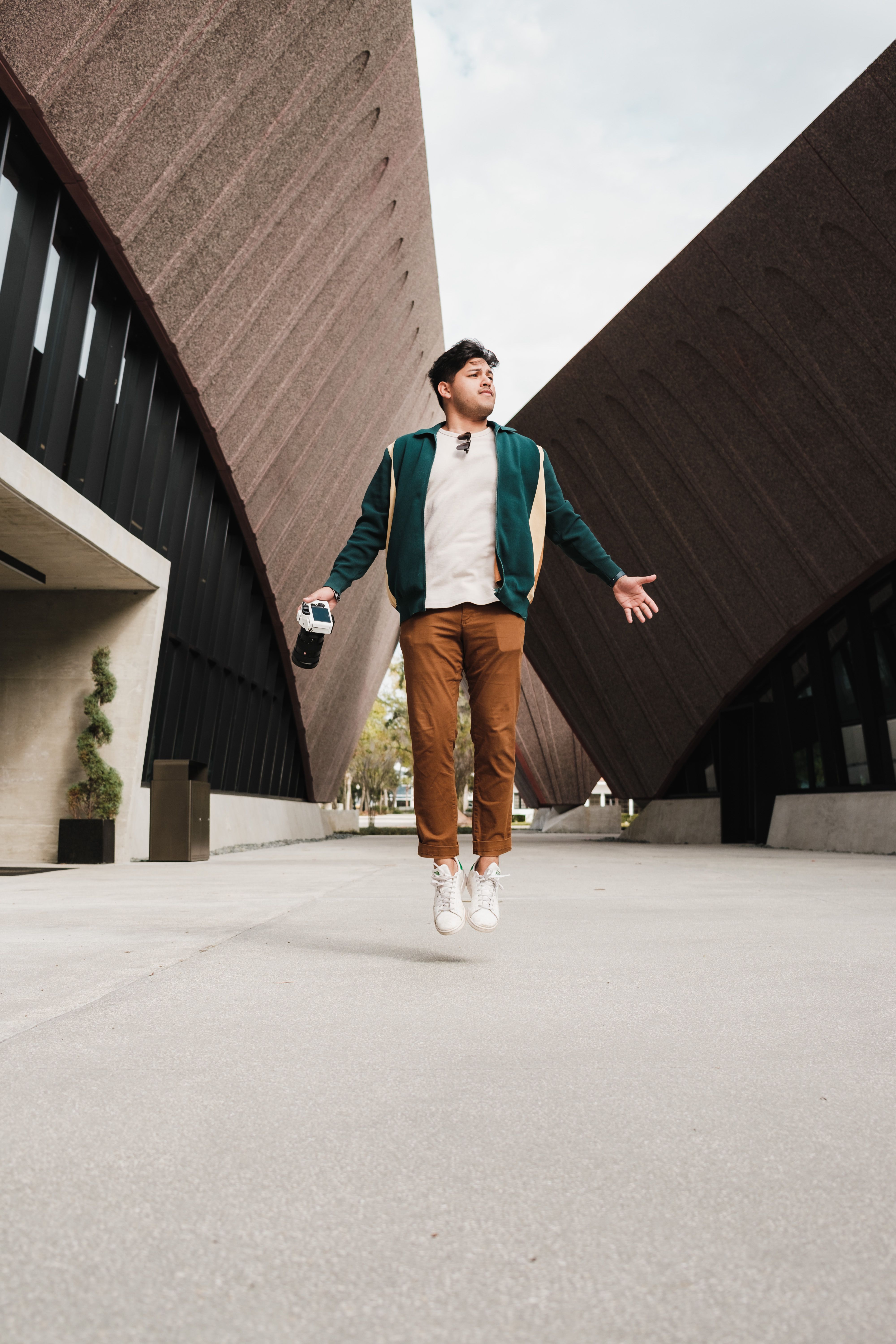 Man in Jacket Jumping · Free Stock Photo