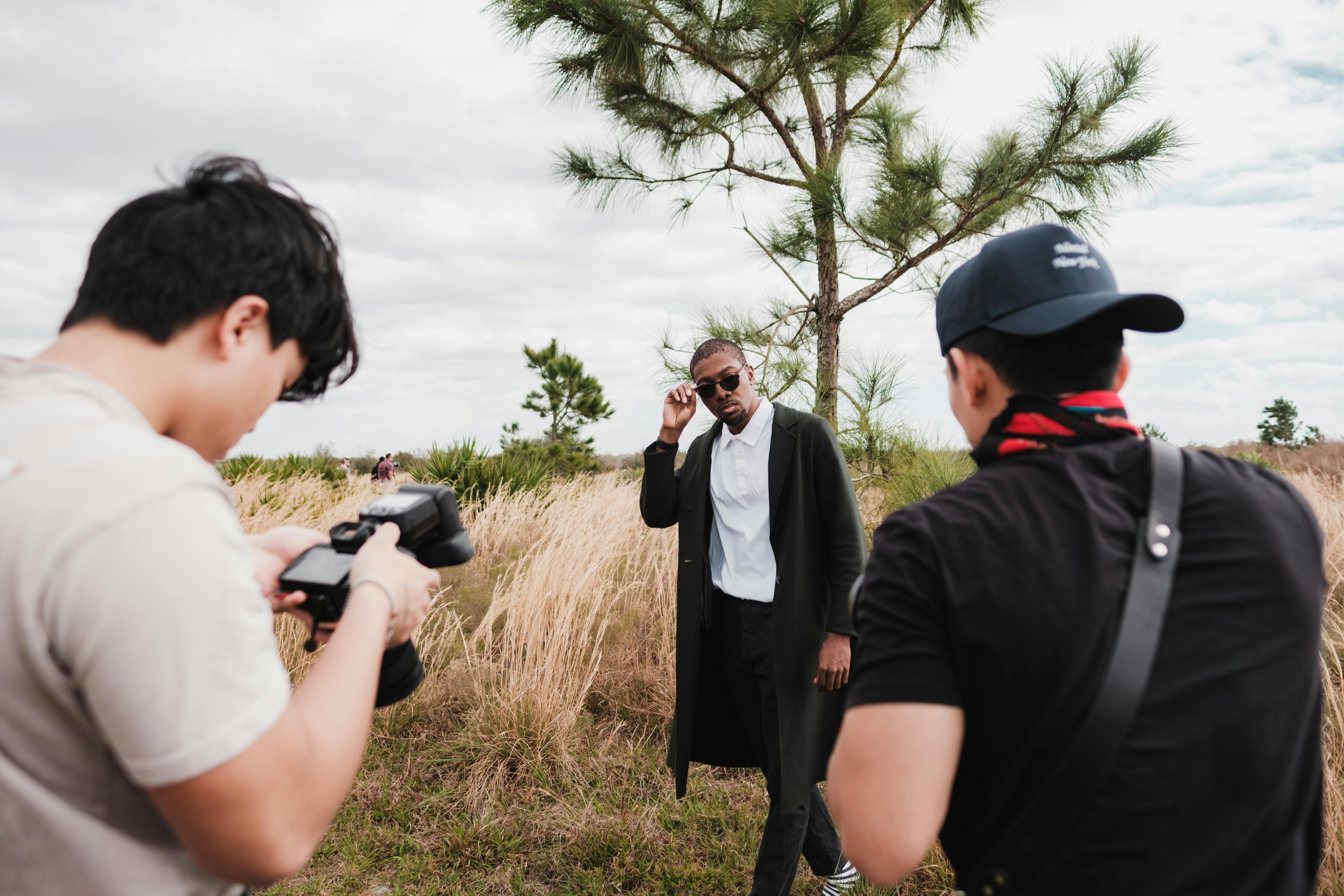 Photo of a Model posing During a Photo Shoot · Free Stock Photo