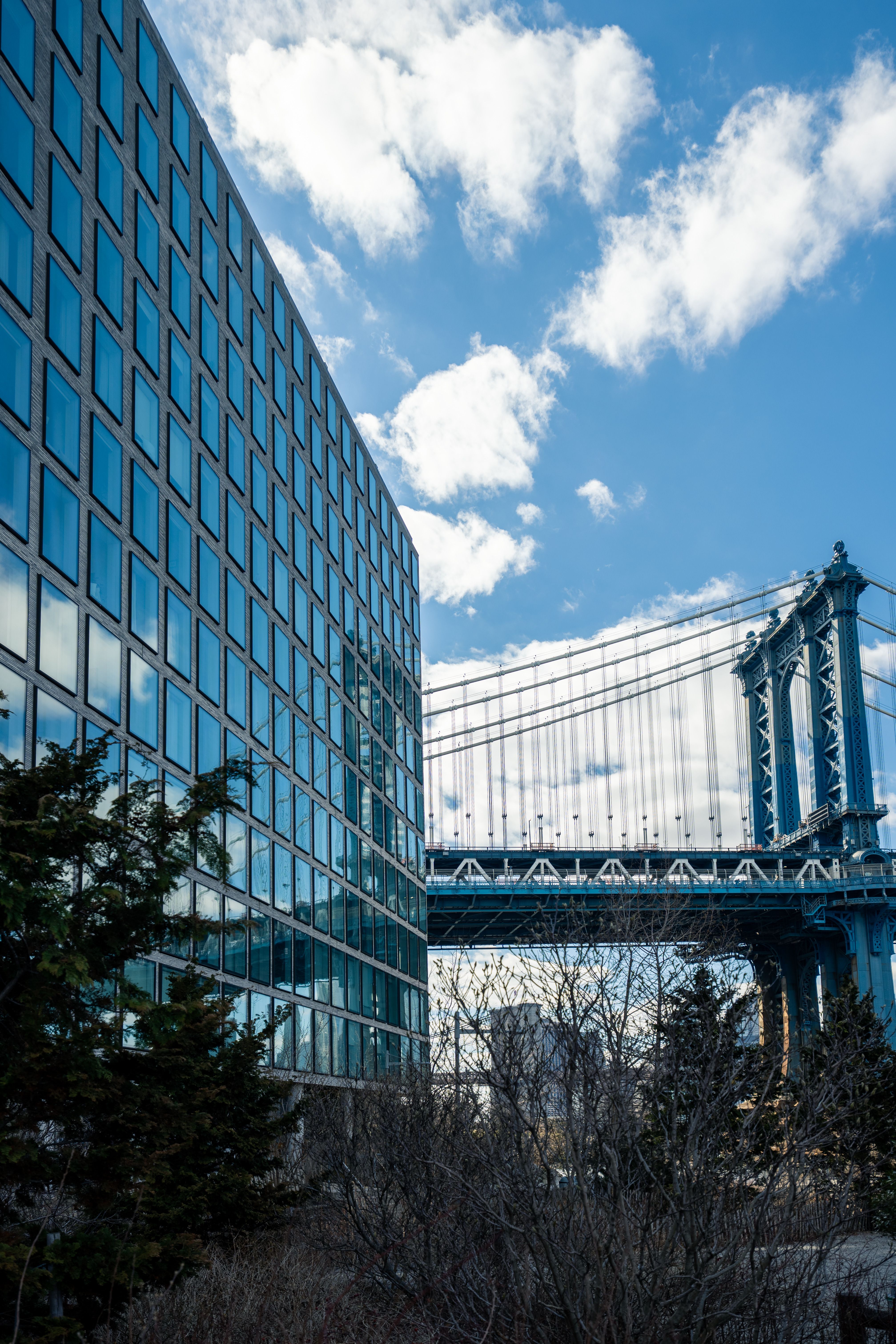 Clouds over Bridge and Building in City · Free Stock Photo