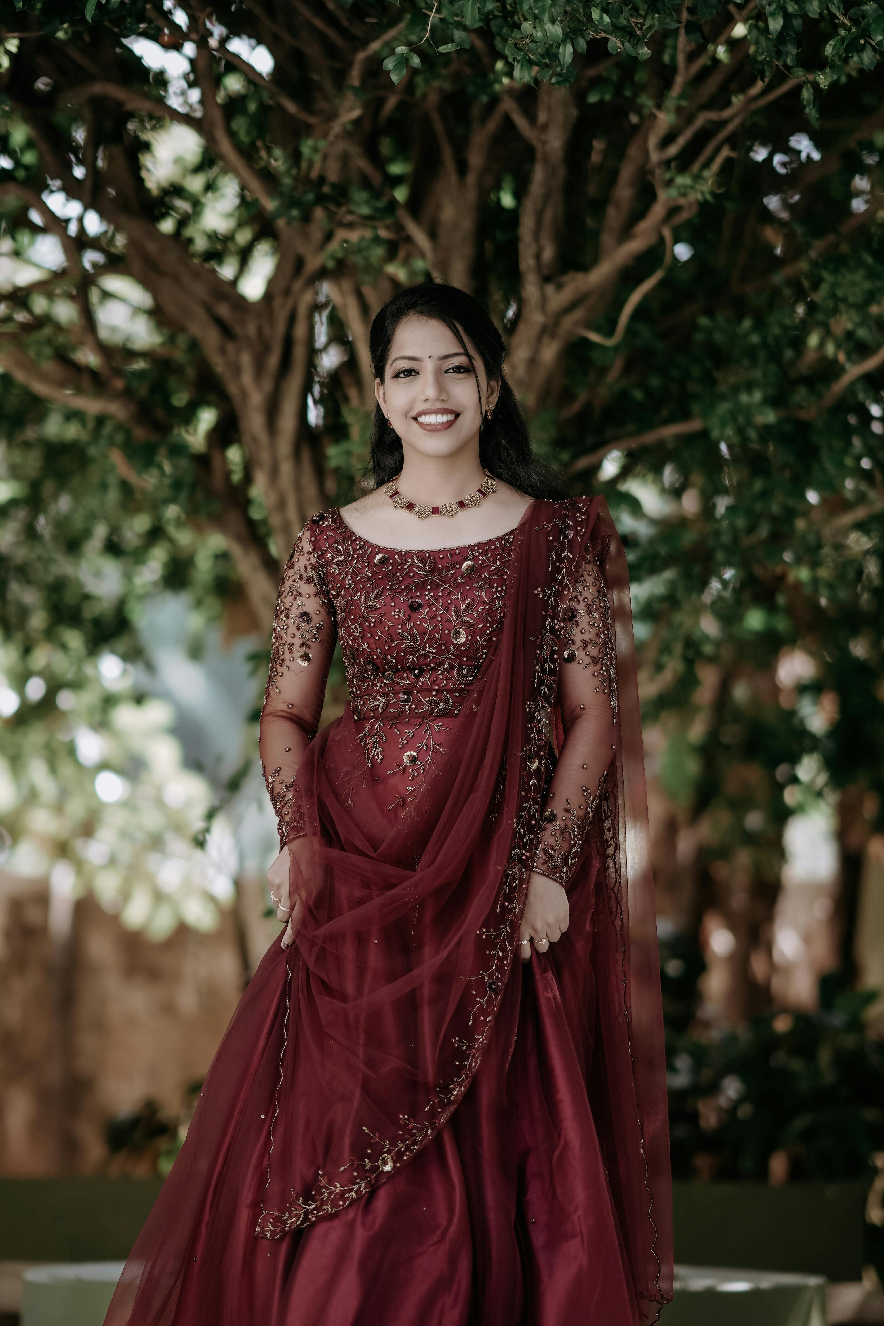 Woman in a Traditional Indian Long Red Dress Standing in Front of City ...