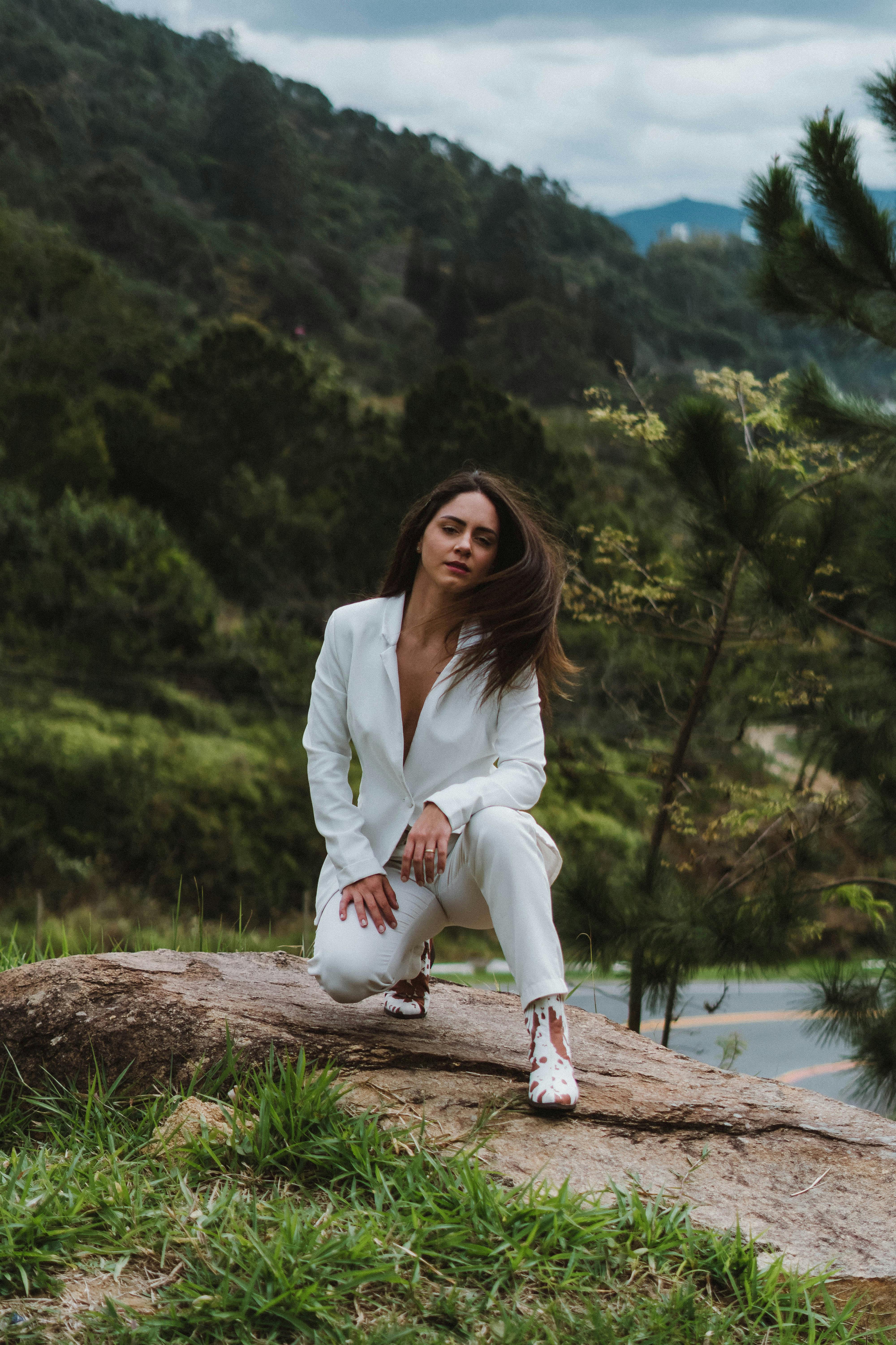 Woman on a Fashion Photoshoot Posing in Mountains · Free Stock Photo