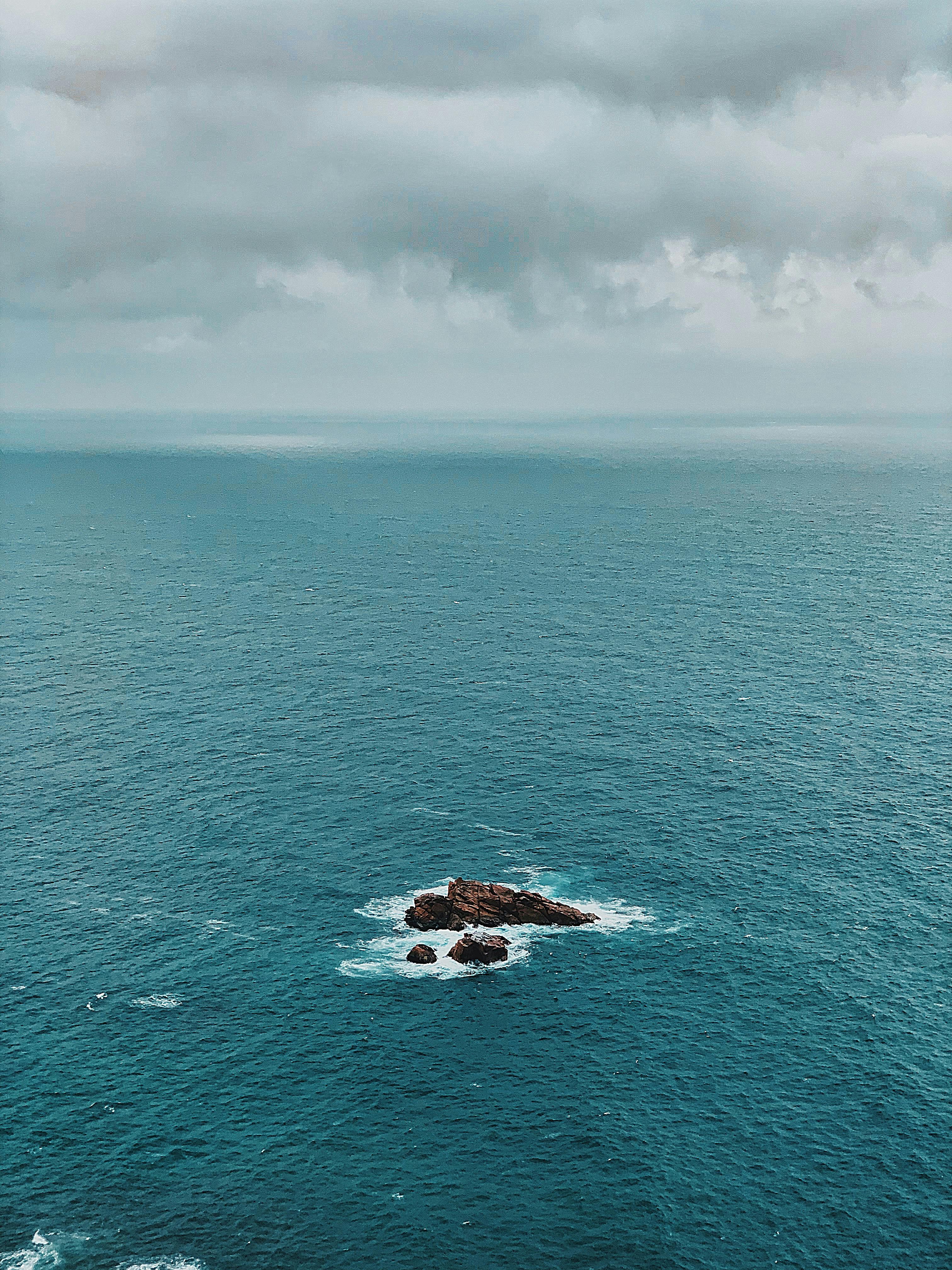 Tiny Island in Sea · Free Stock Photo