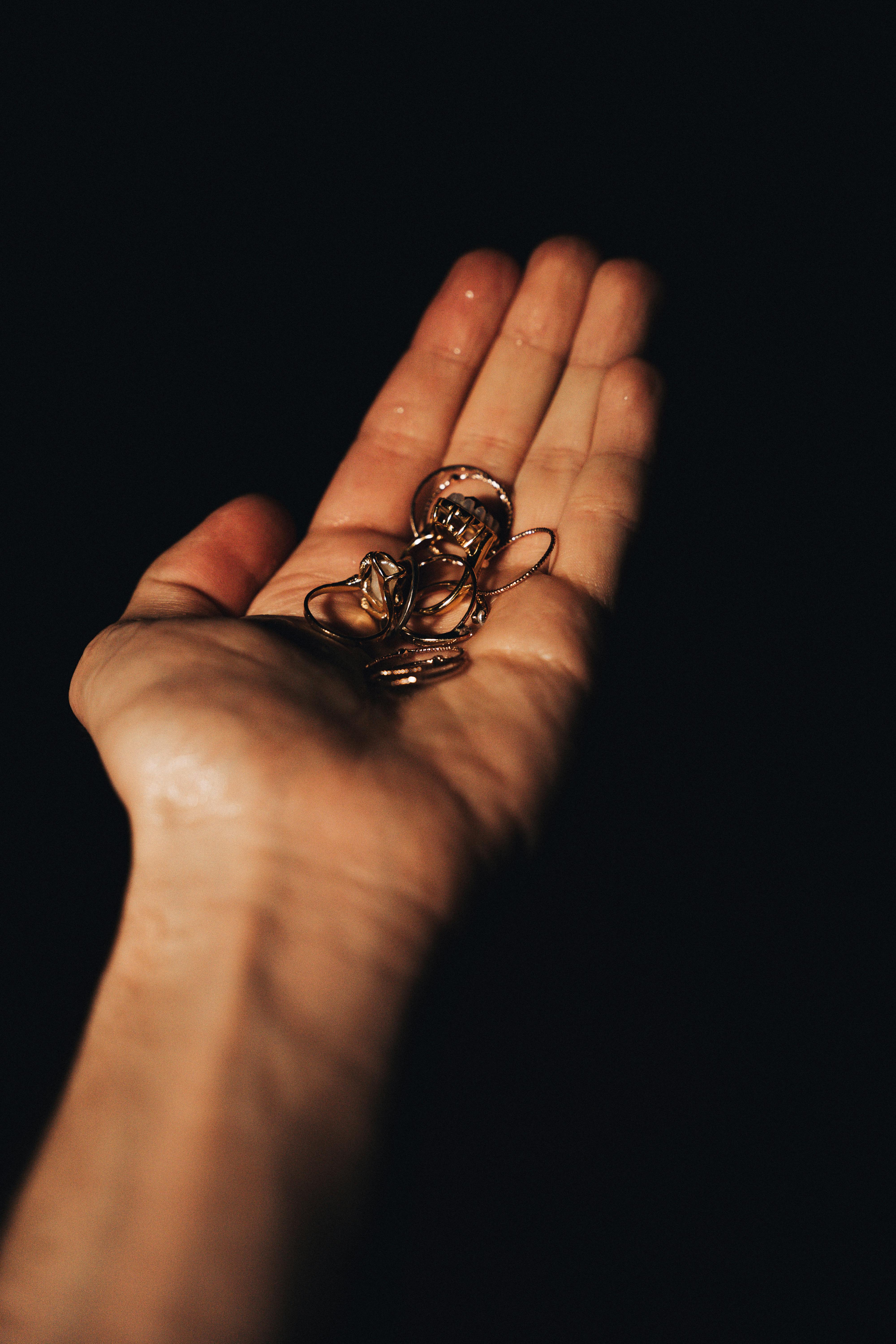 Open Hand Presenting Rings · Free Stock Photo