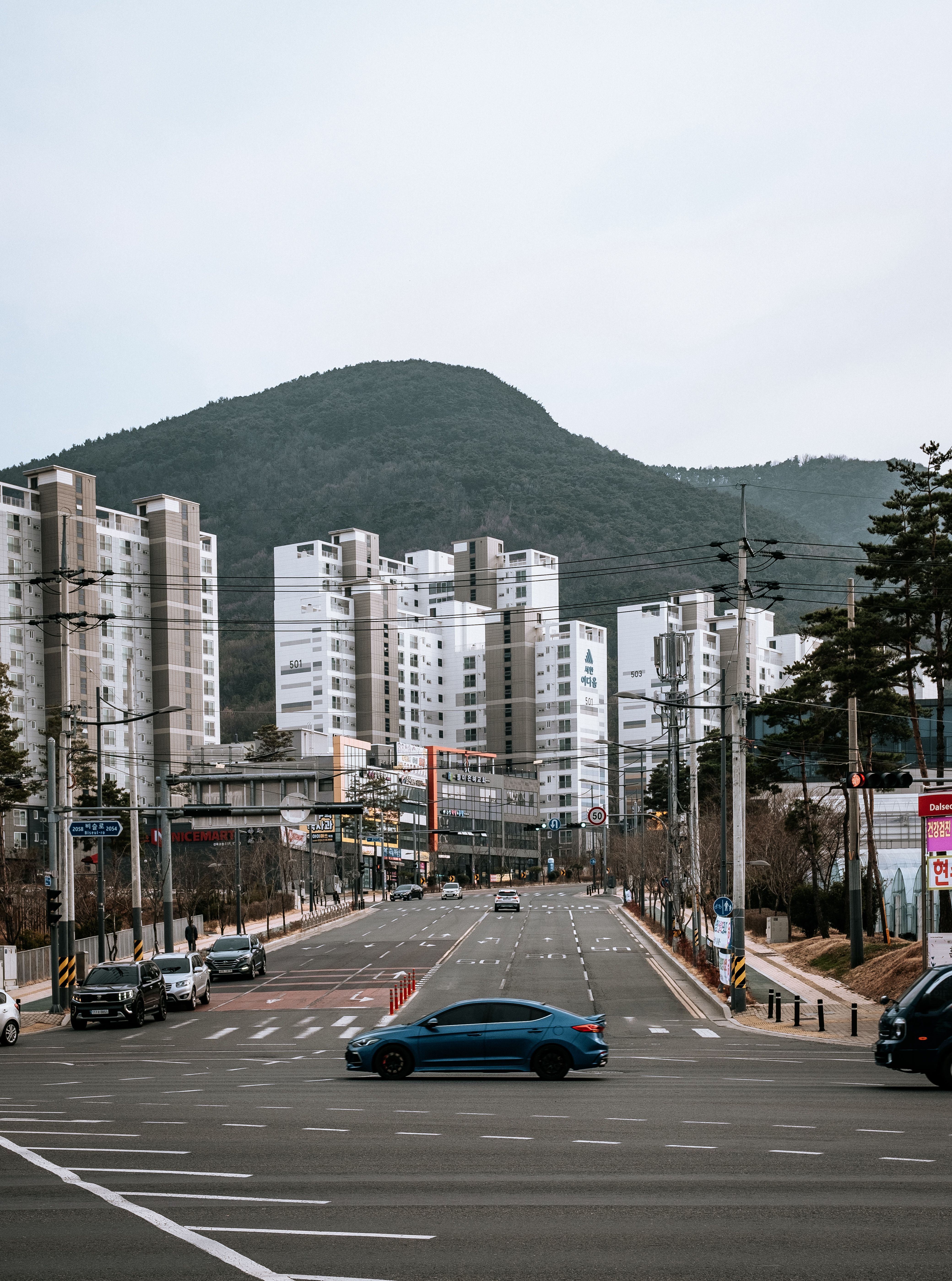 A City Street and Modern Buildings in a Valley · Free Stock Photo