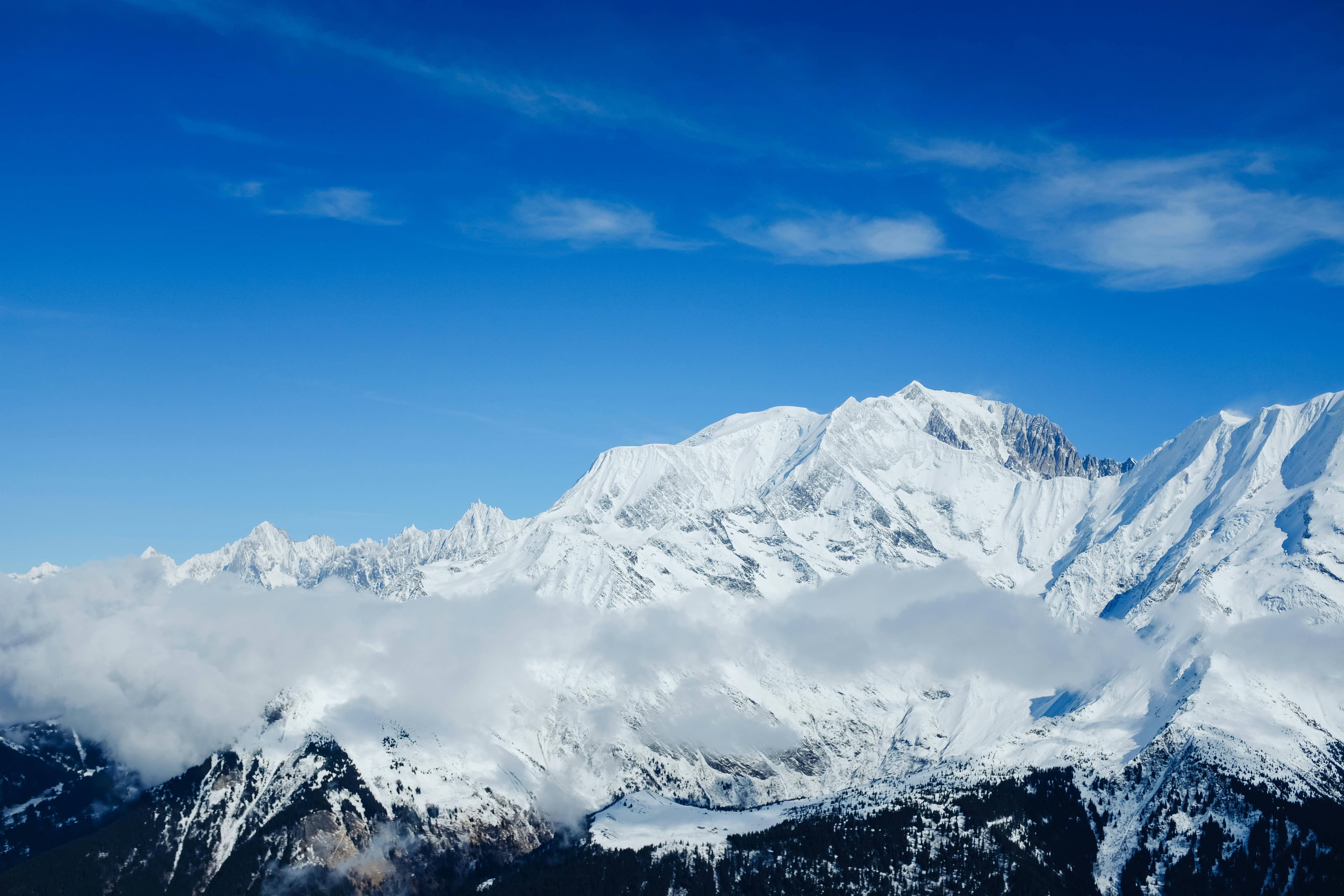 Woman Beside Lake in Mountains · Free Stock Photo