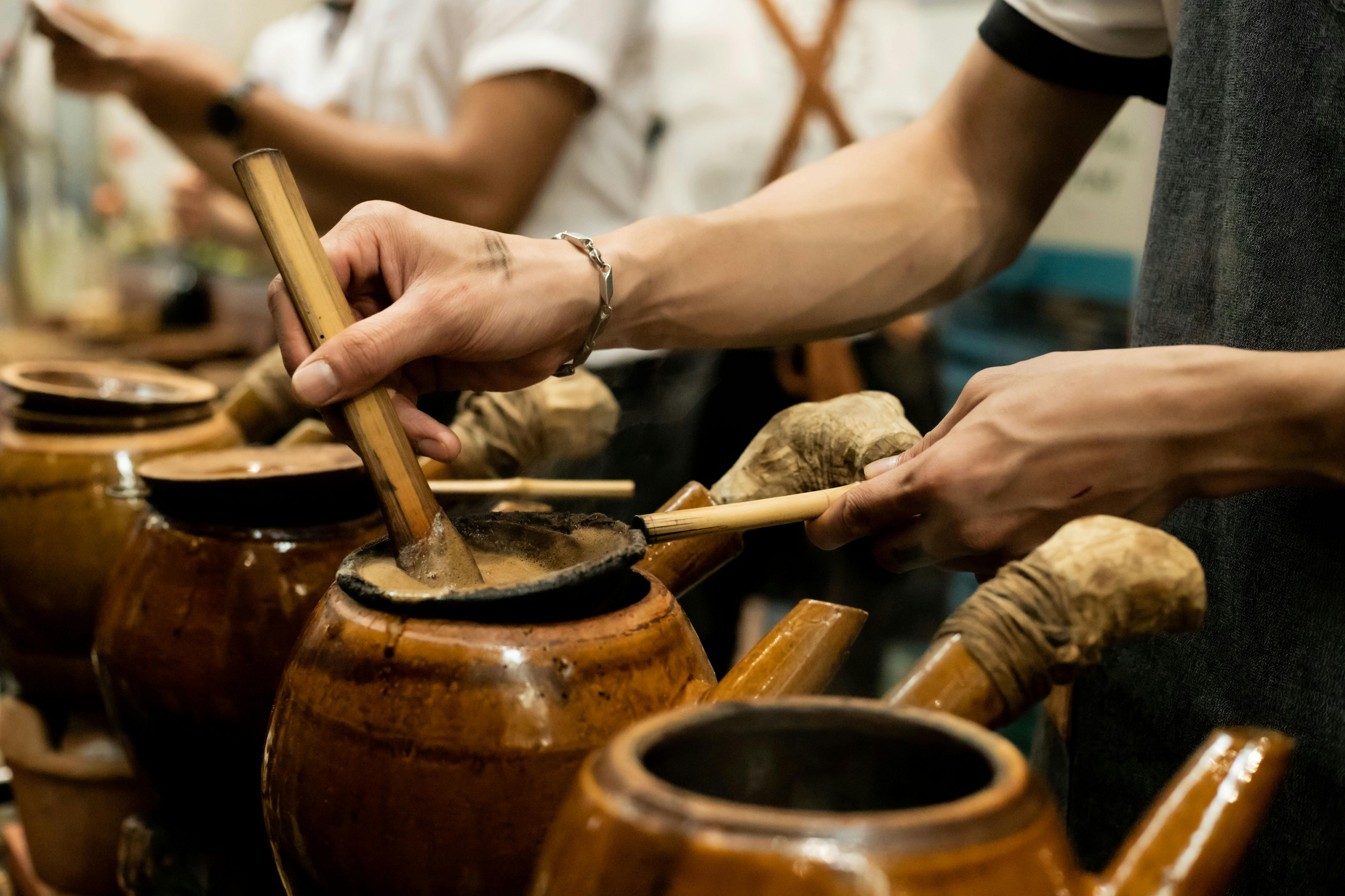 Preparing Drink in Old Traditional Jars · Free Stock Photo