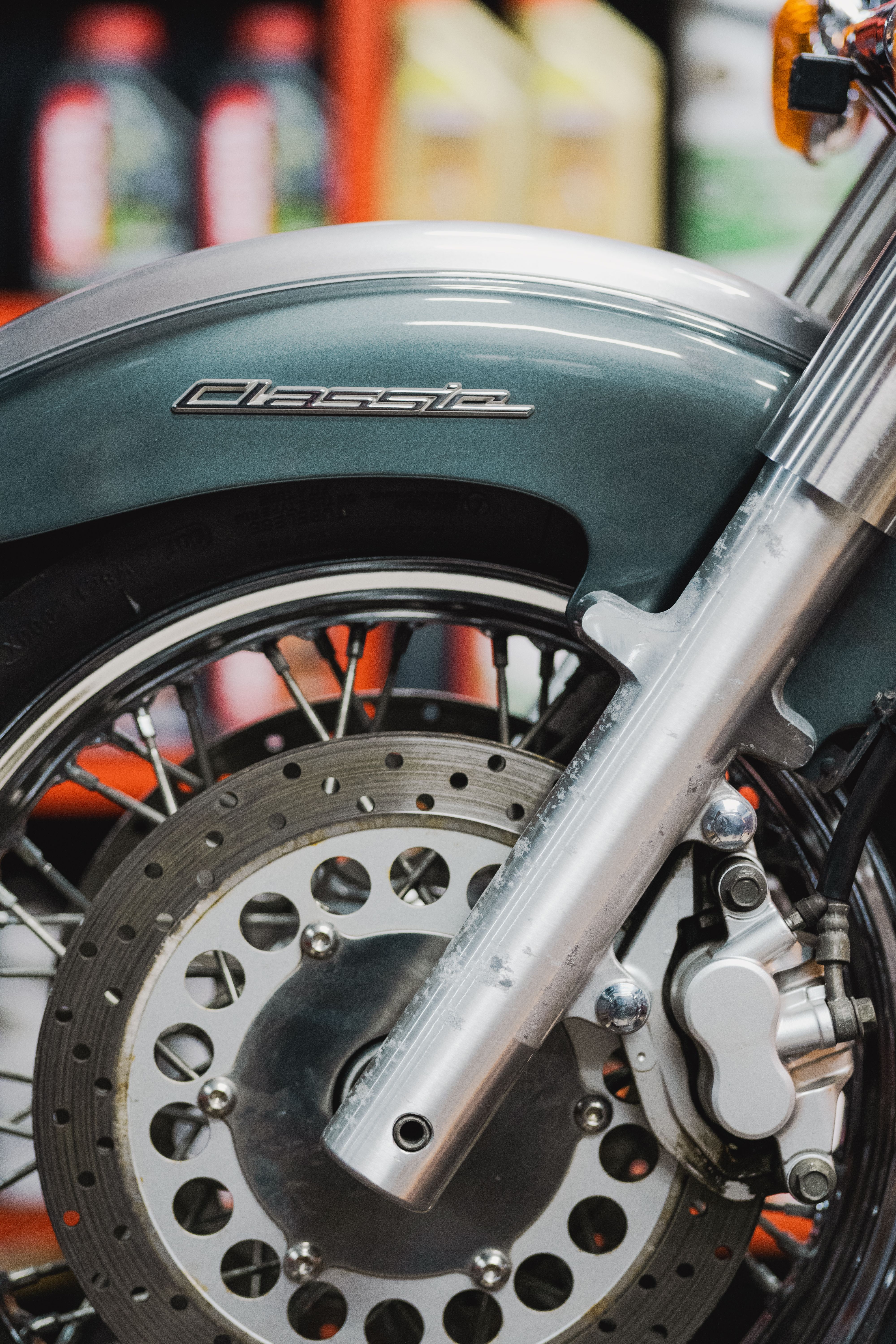 Close up of Motorcycle Fork and Wheel · Free Stock Photo
