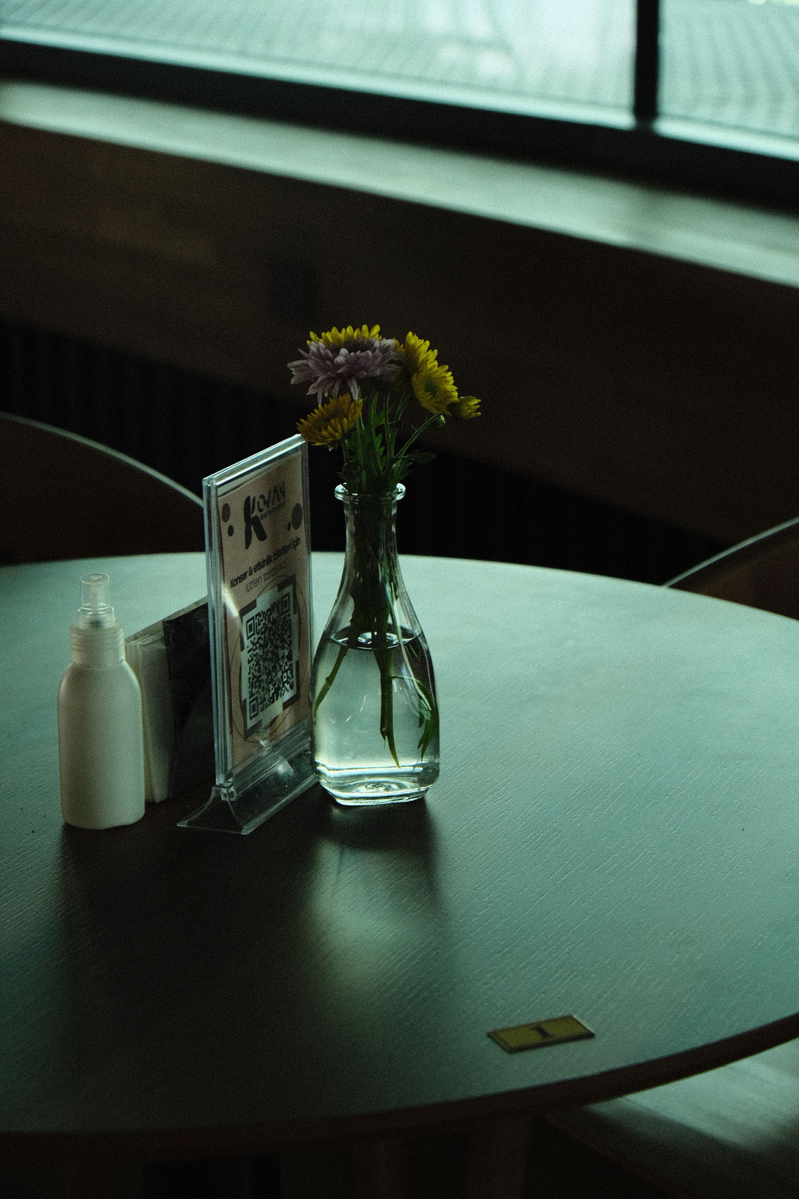 Flowers in Vase on Table in Cafe · Free Stock Photo