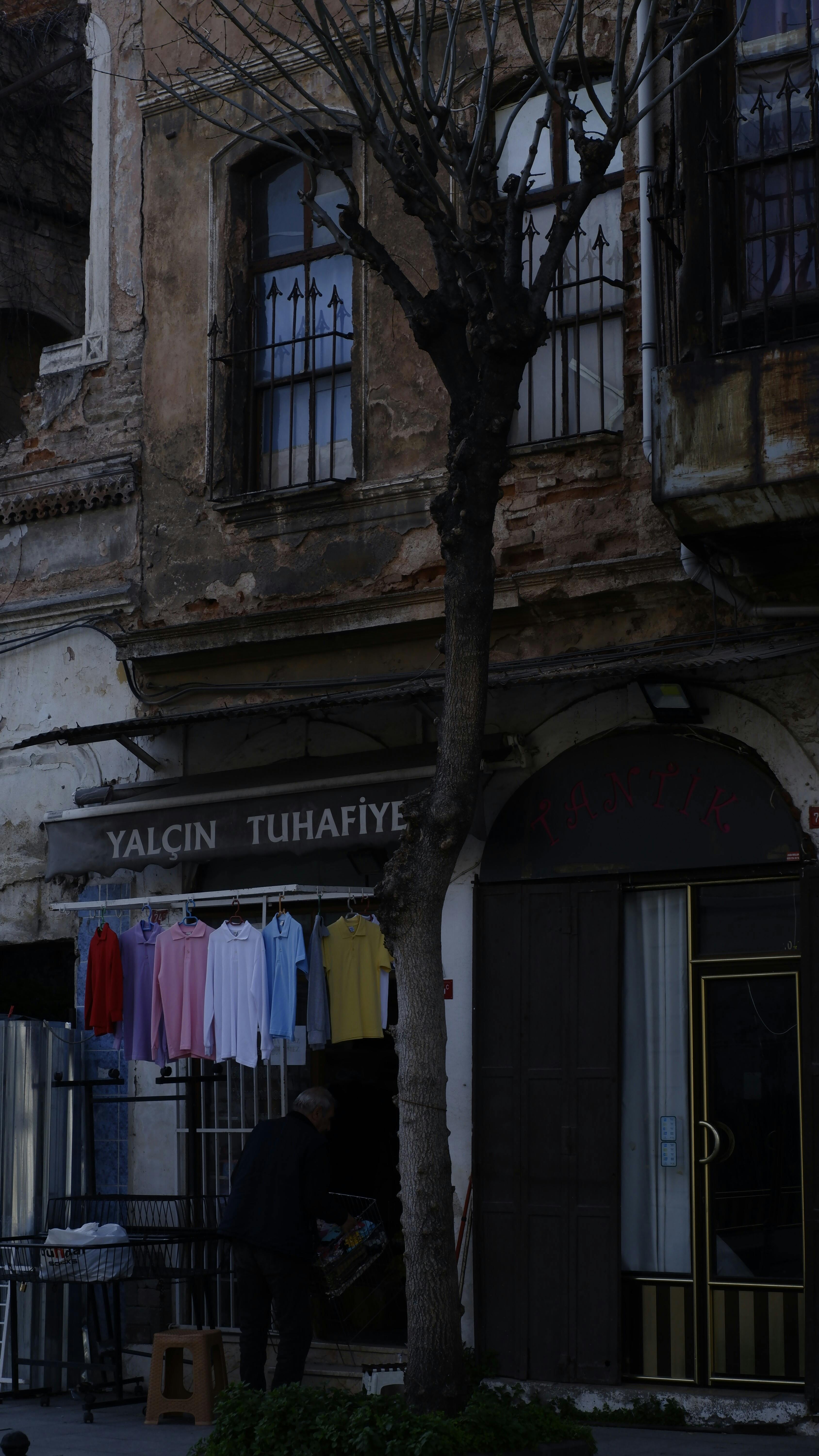 Clothing Store in Rundown Building · Free Stock Photo