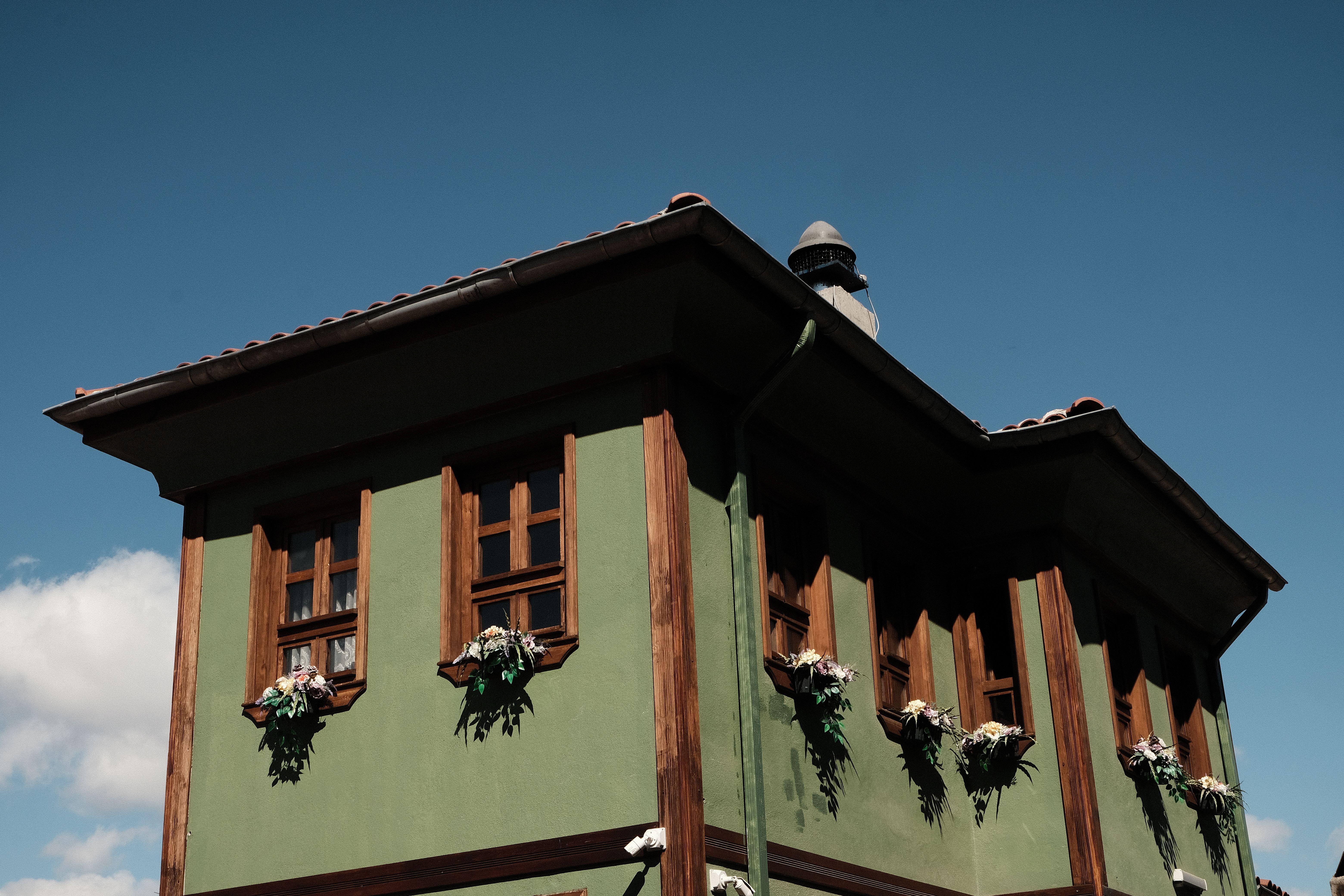 A Traditional Green House · Free Stock Photo