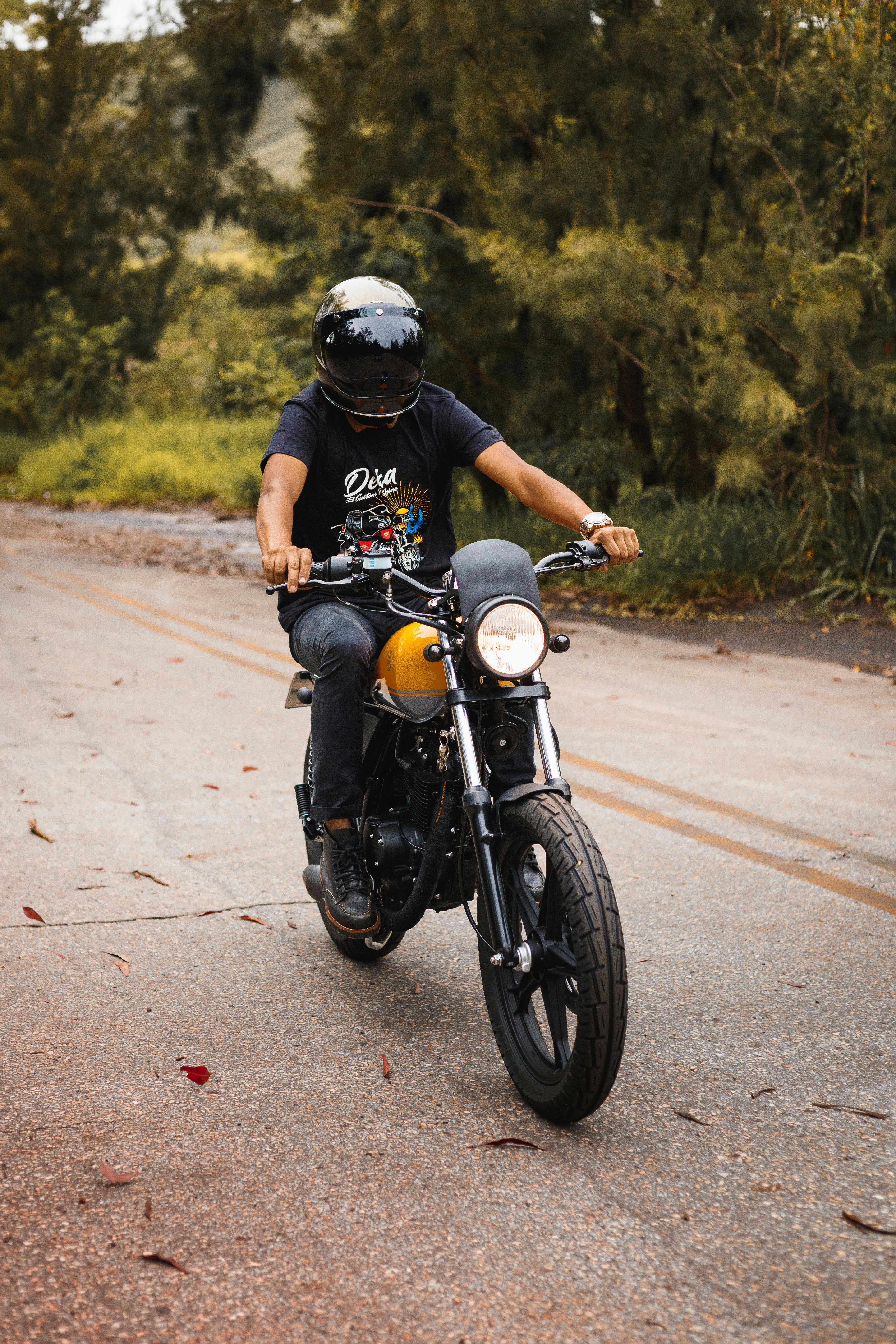 Man Riding a Motorcycle Photo · Free Stock Photo