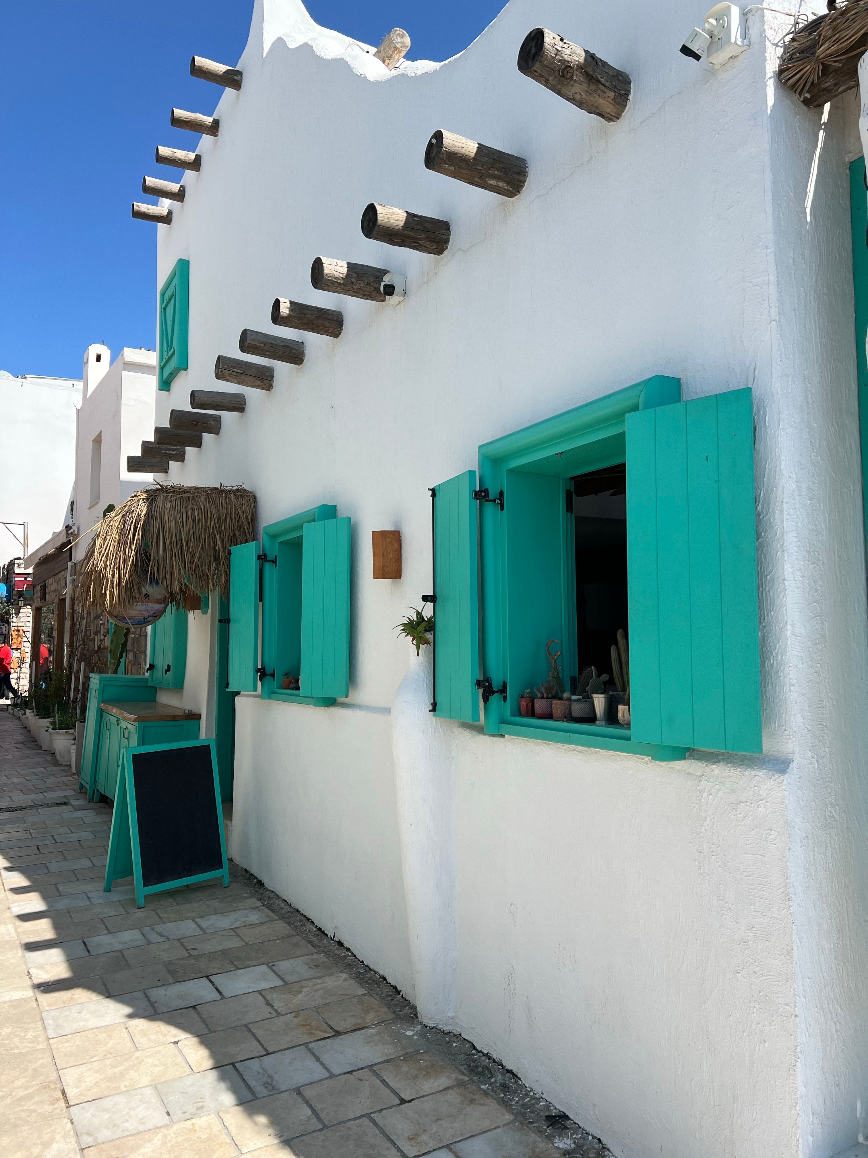 White Traditional House with Turquoise Window Shutters · Free Stock Photo