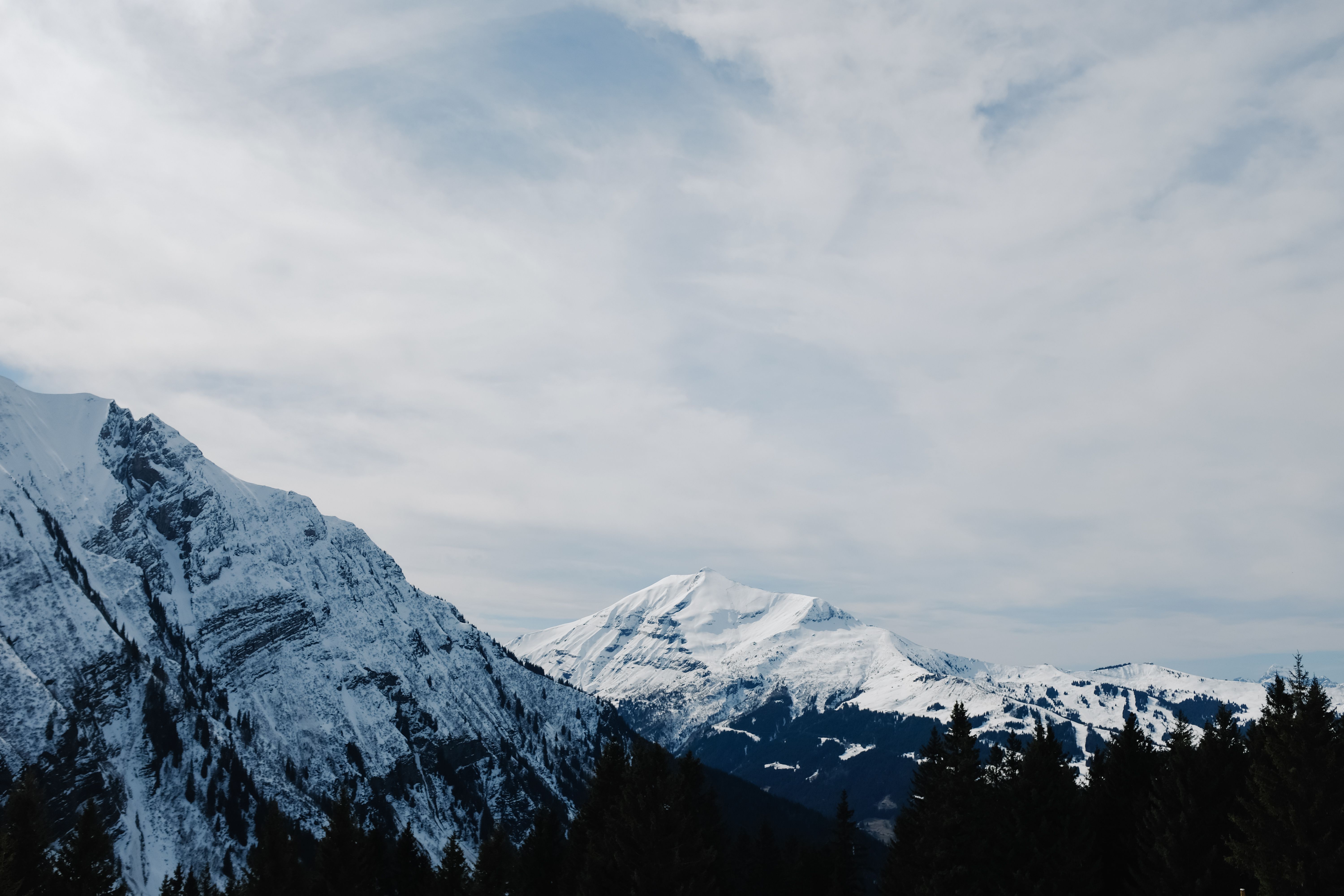 Overcast over Rocks in Snow · Free Stock Photo