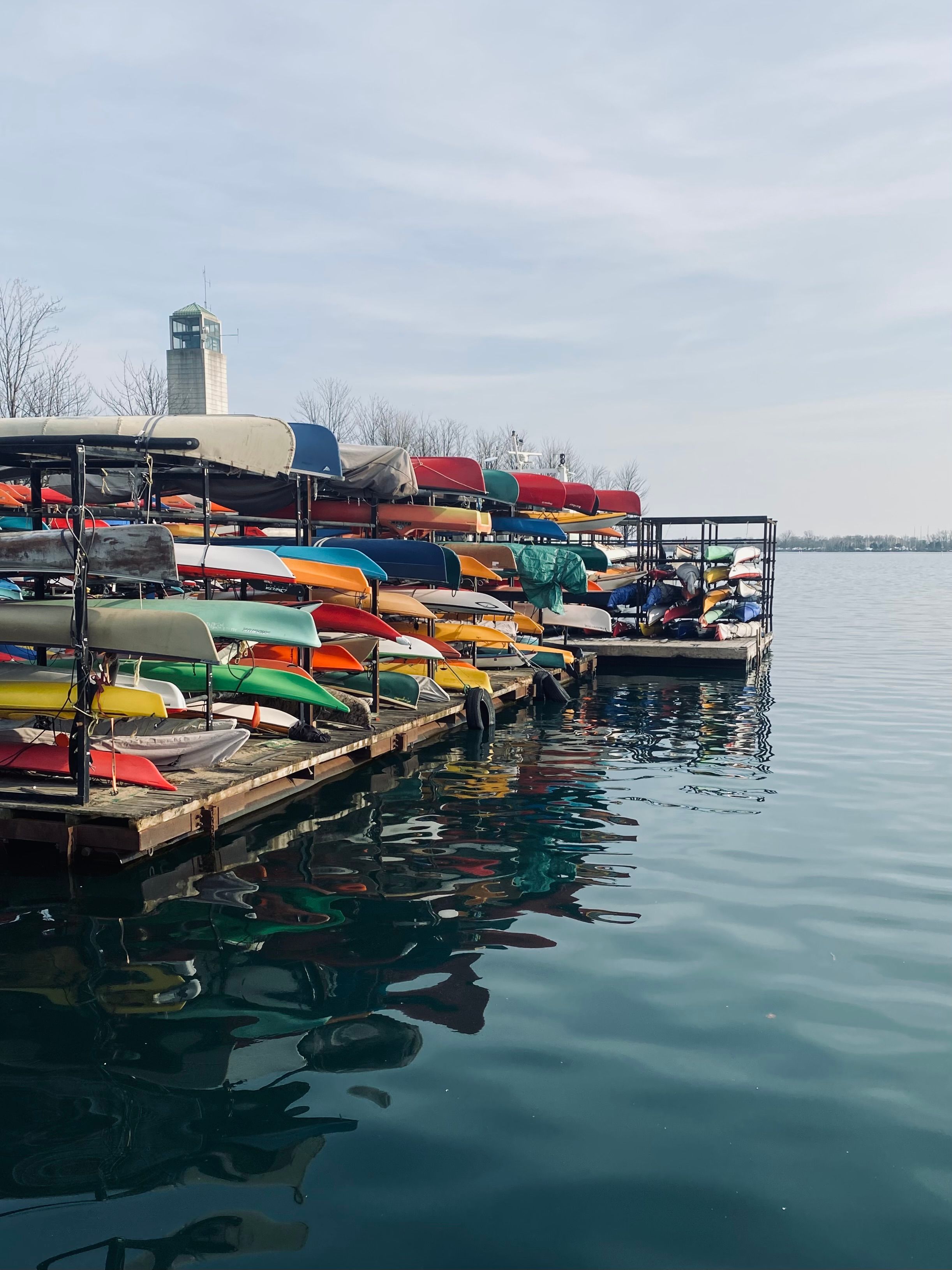 A dock with many canoes on it · Free Stock Photo