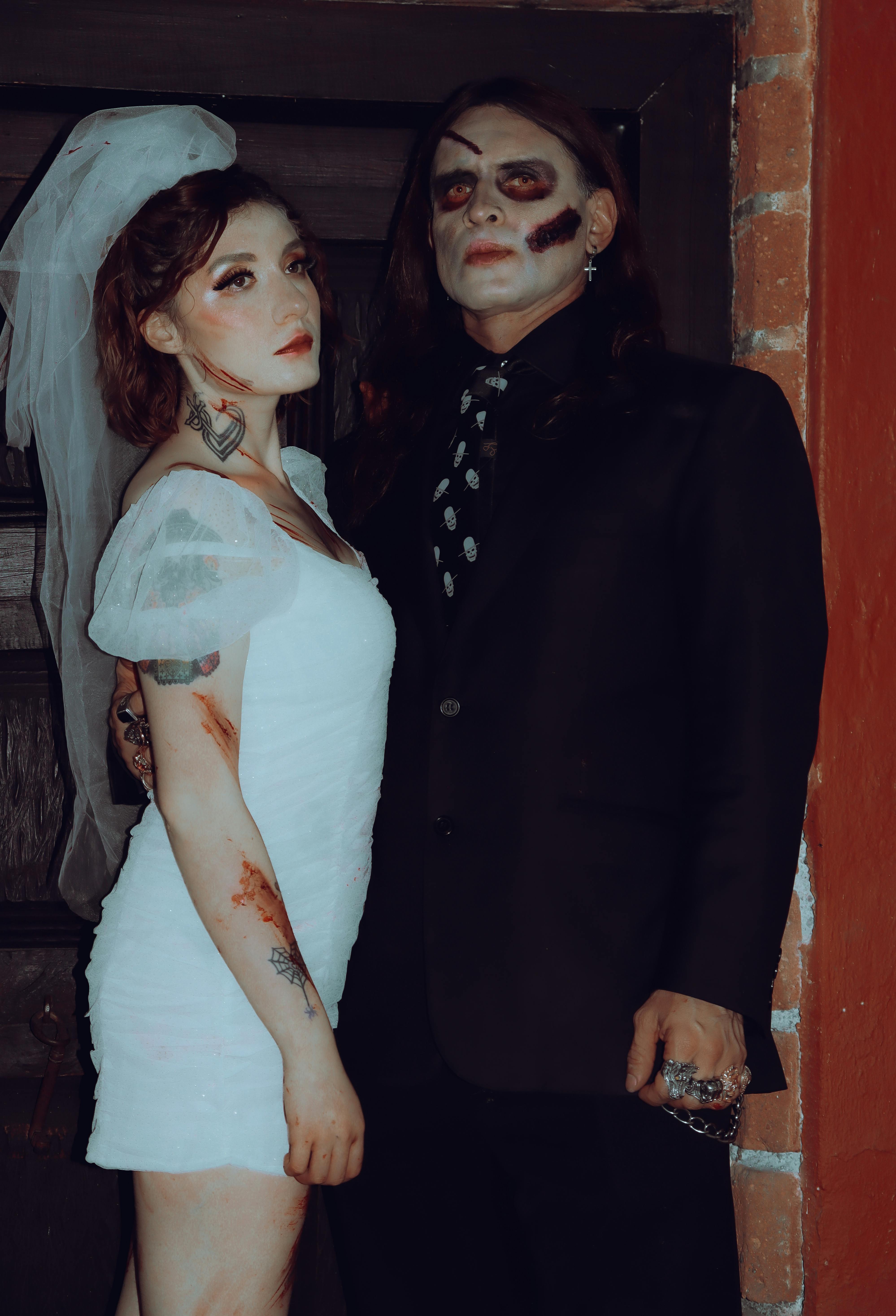 Couple in Costumes of Spooky Bride and Groom · Free Stock Photo