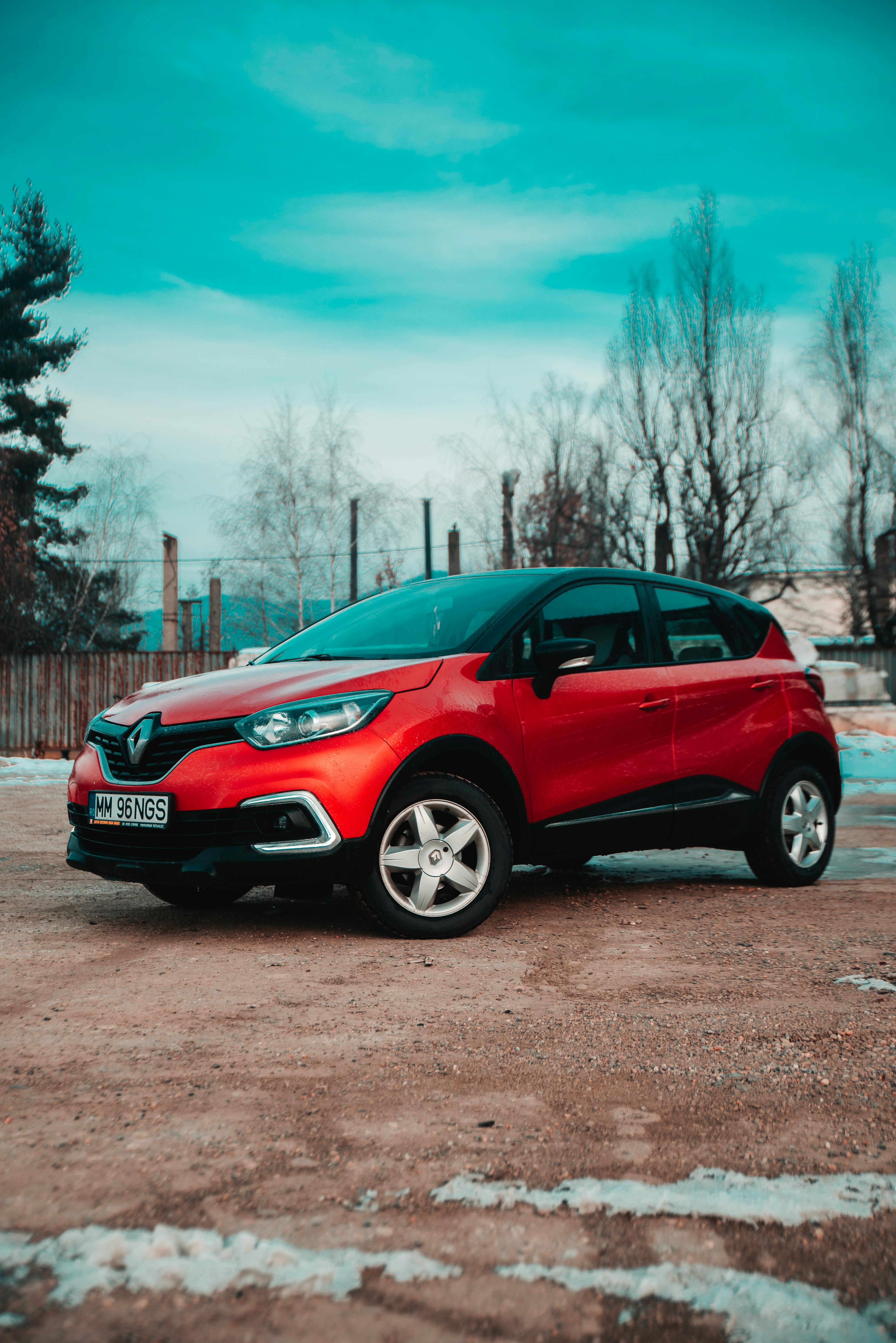A Red Renault Captur under Blue Sky · Free Stock Photo
