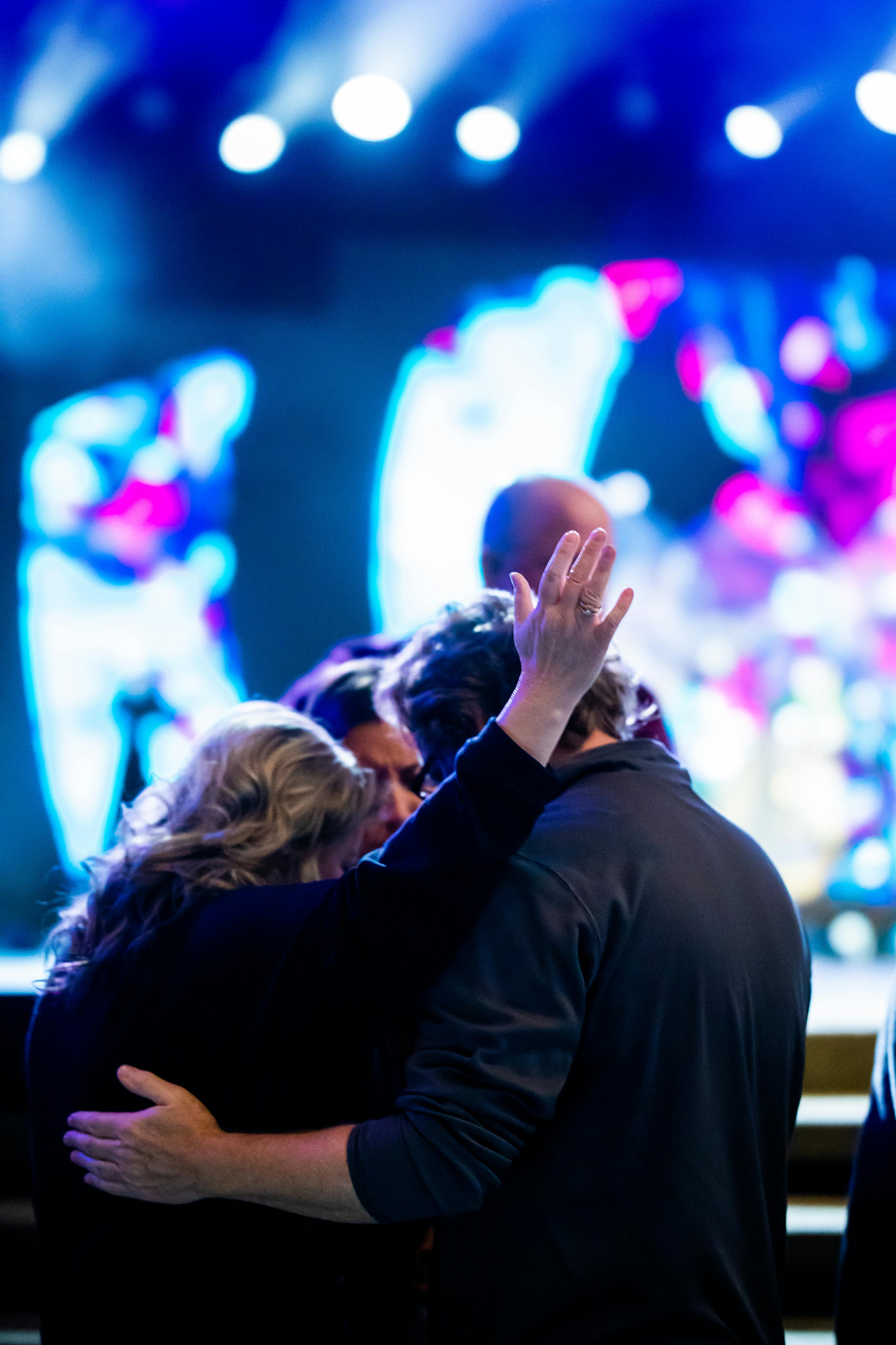 Woman and Man Hugging on Concert · Free Stock Photo