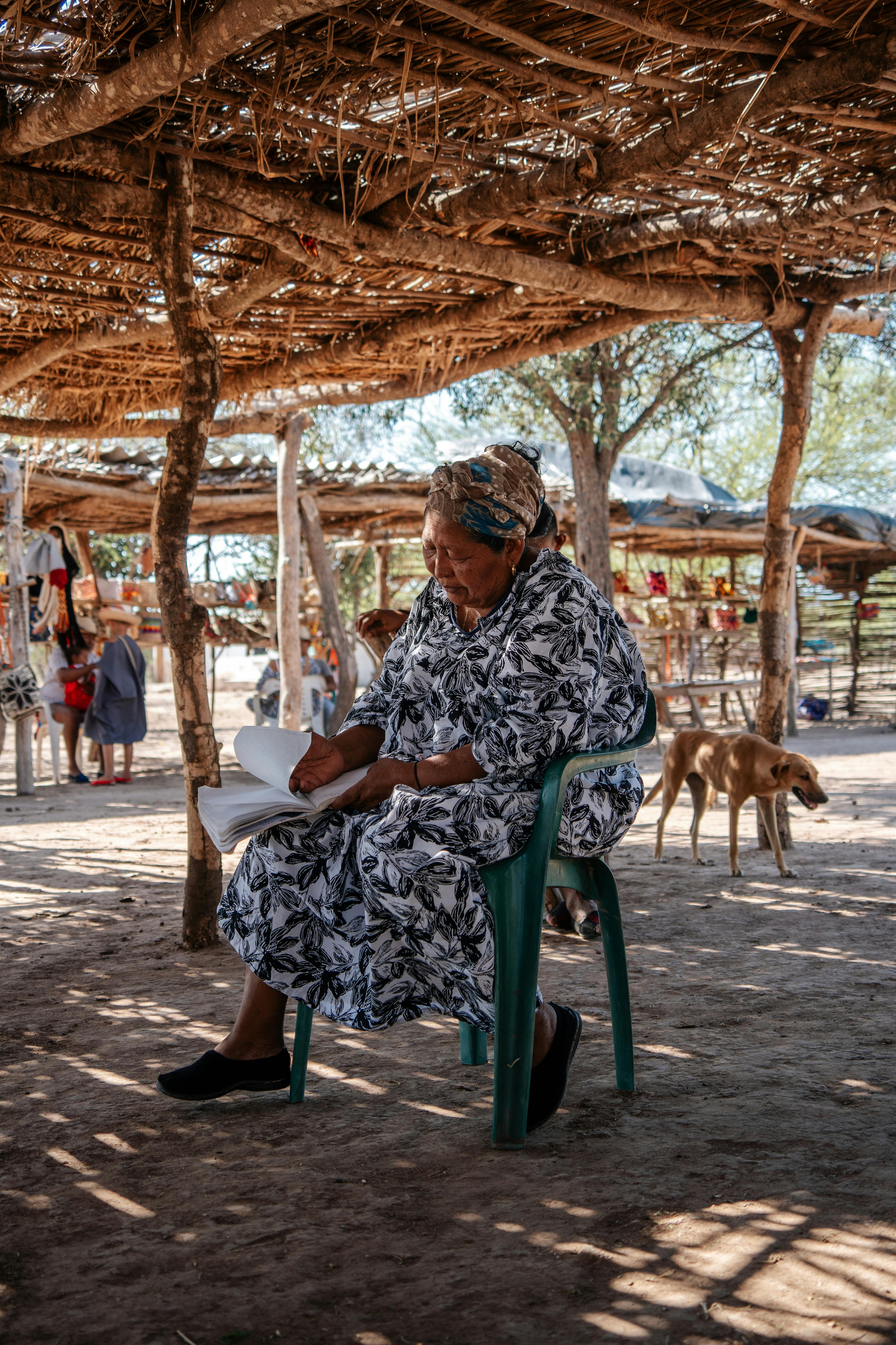 Village Woman with Paper Notebook · Free Stock Photo