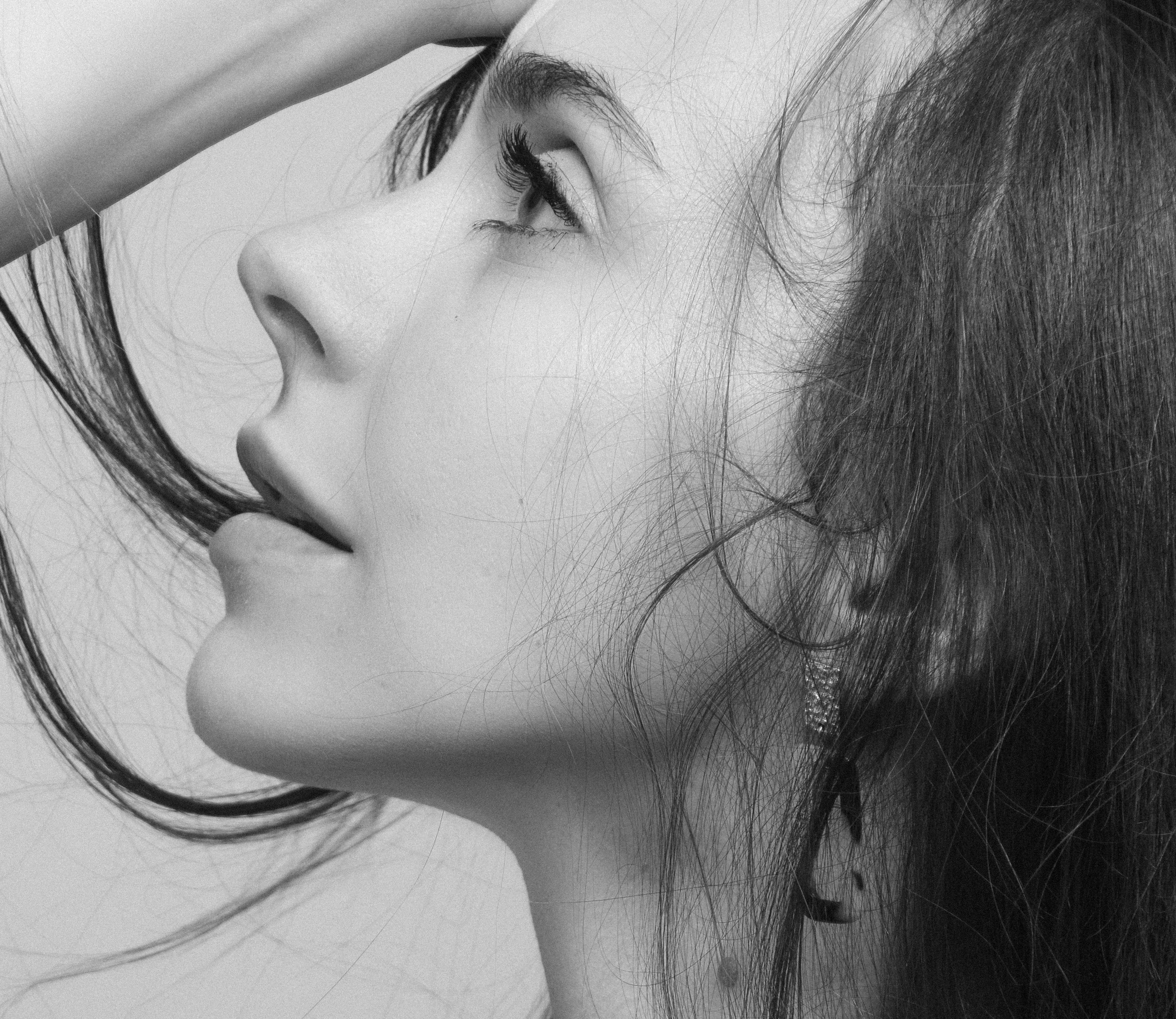 Close-up Side View Portrait of a Young Woman · Free Stock Photo