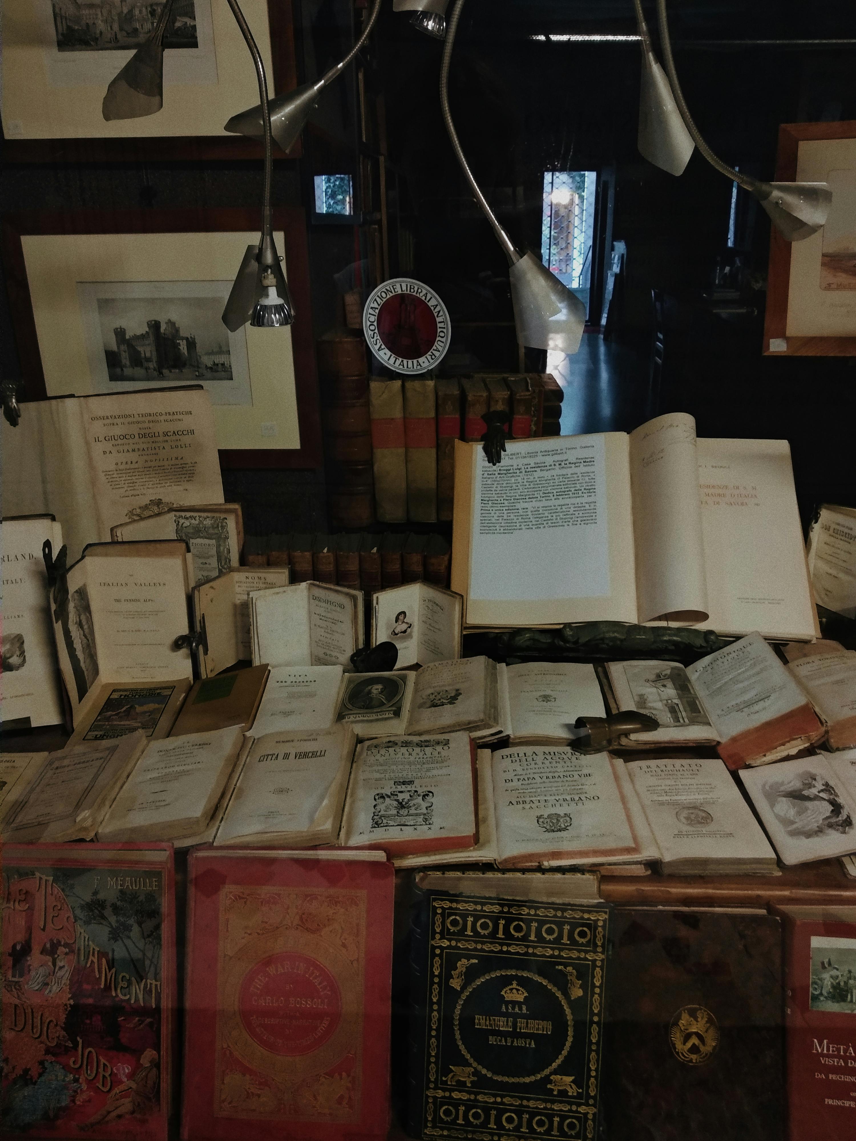 Vintage books in a showcase close-up · Free Stock Photo