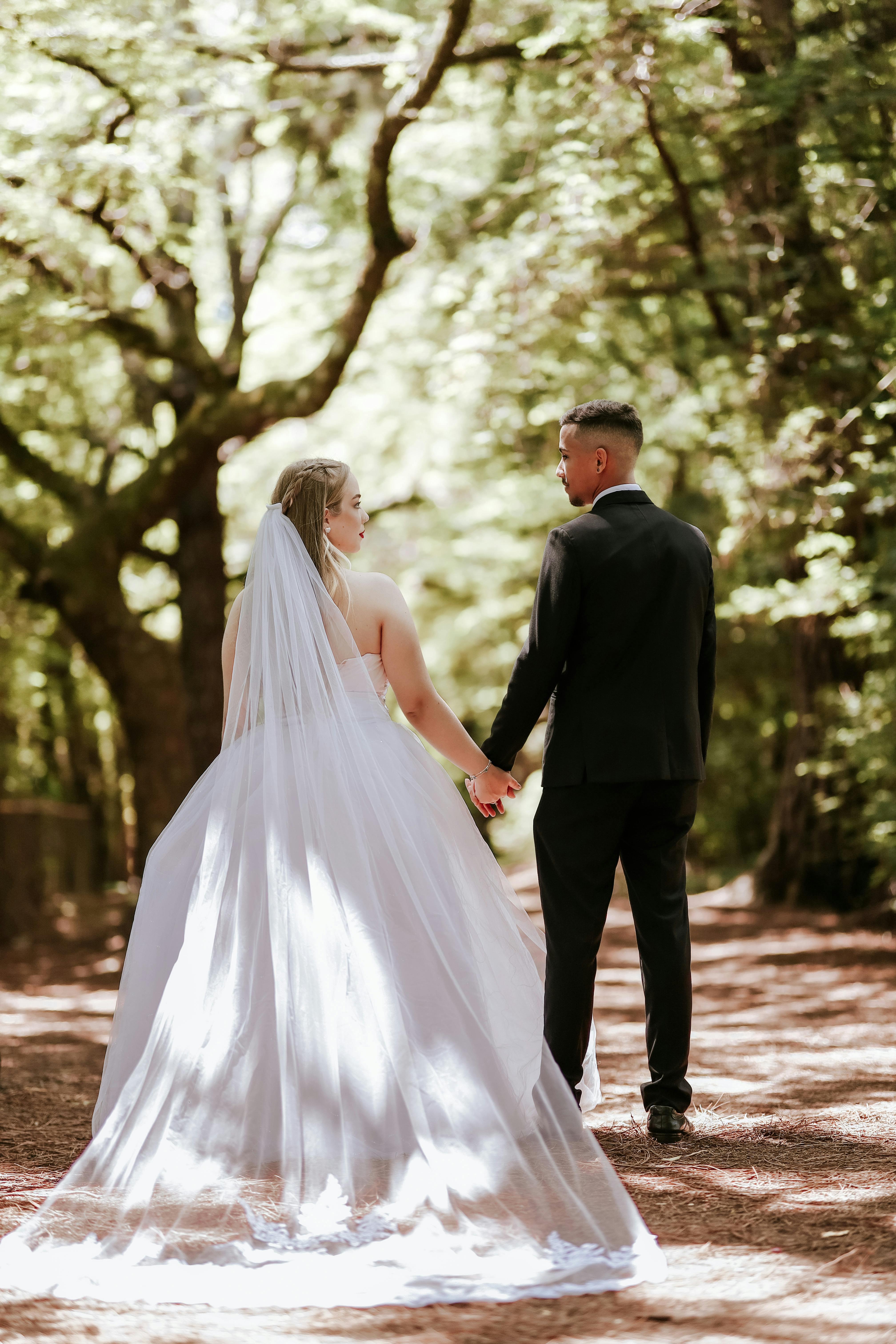 Couple Getting Married in a Forest · Free Stock Photo